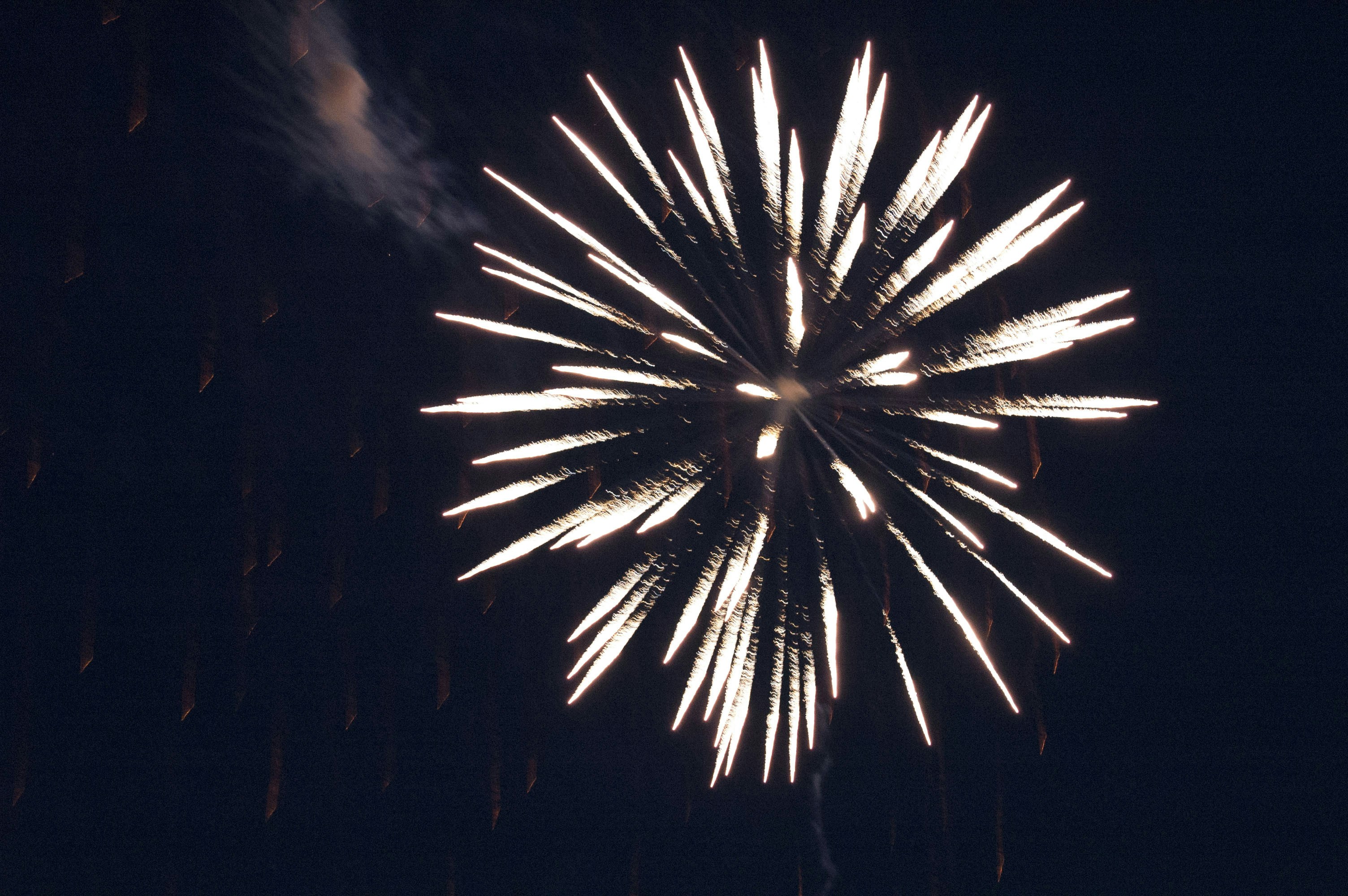 A fireworks is lit up in the night sky photo – Free Night Image on Unsplash