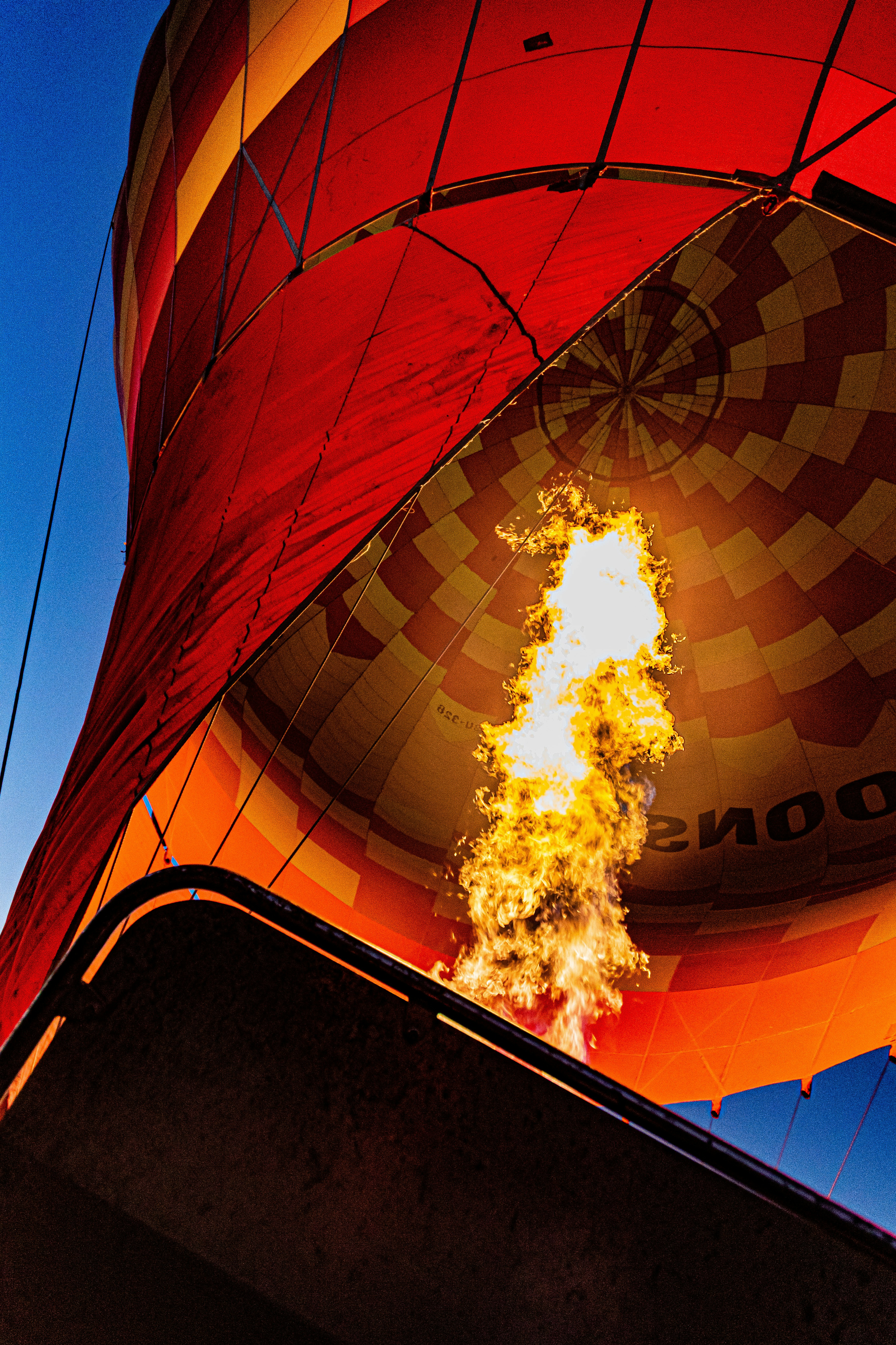 a large hot air balloon with a lot of smoke coming out of it