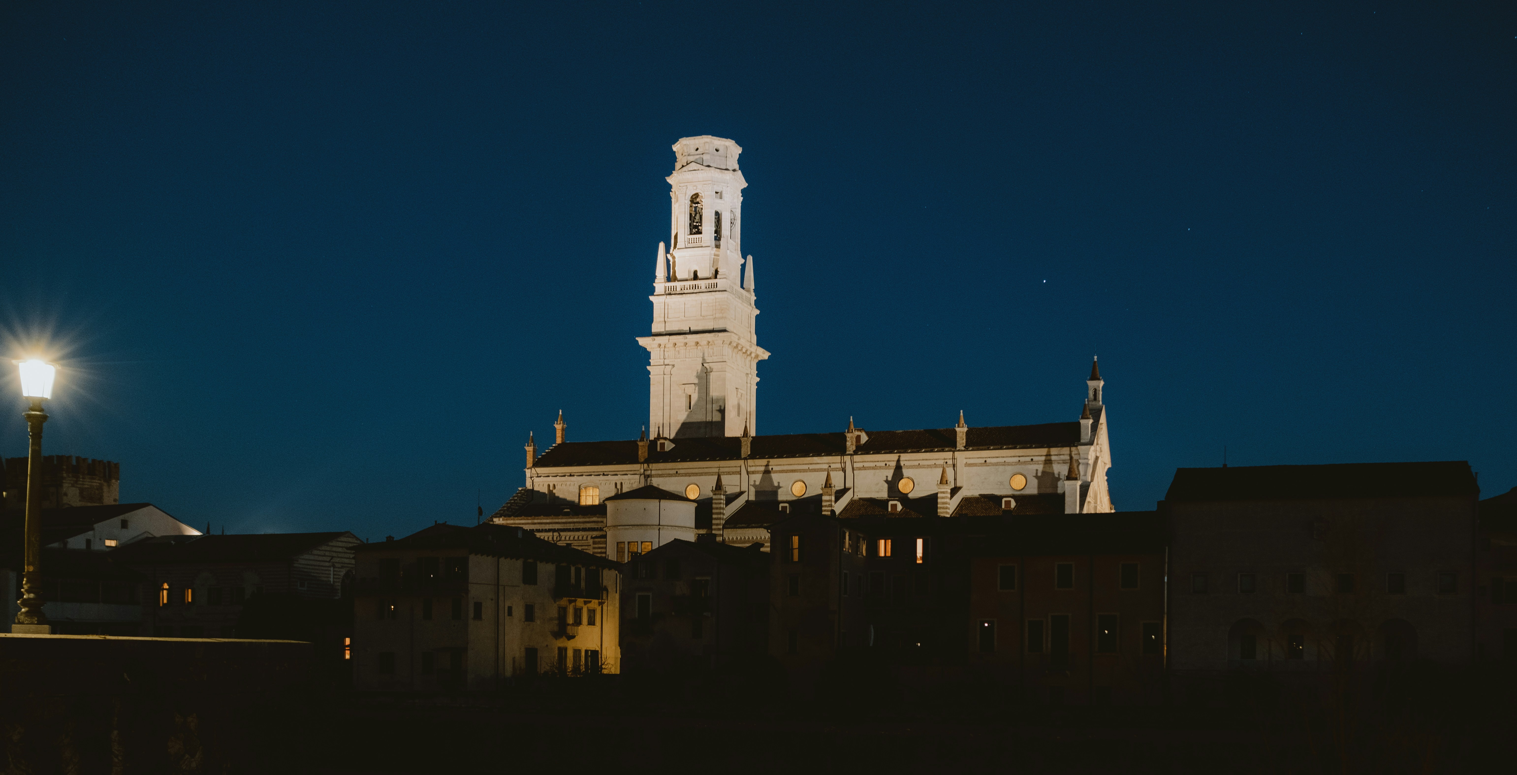 Moonlit Spire Over a Quiet Hill Town