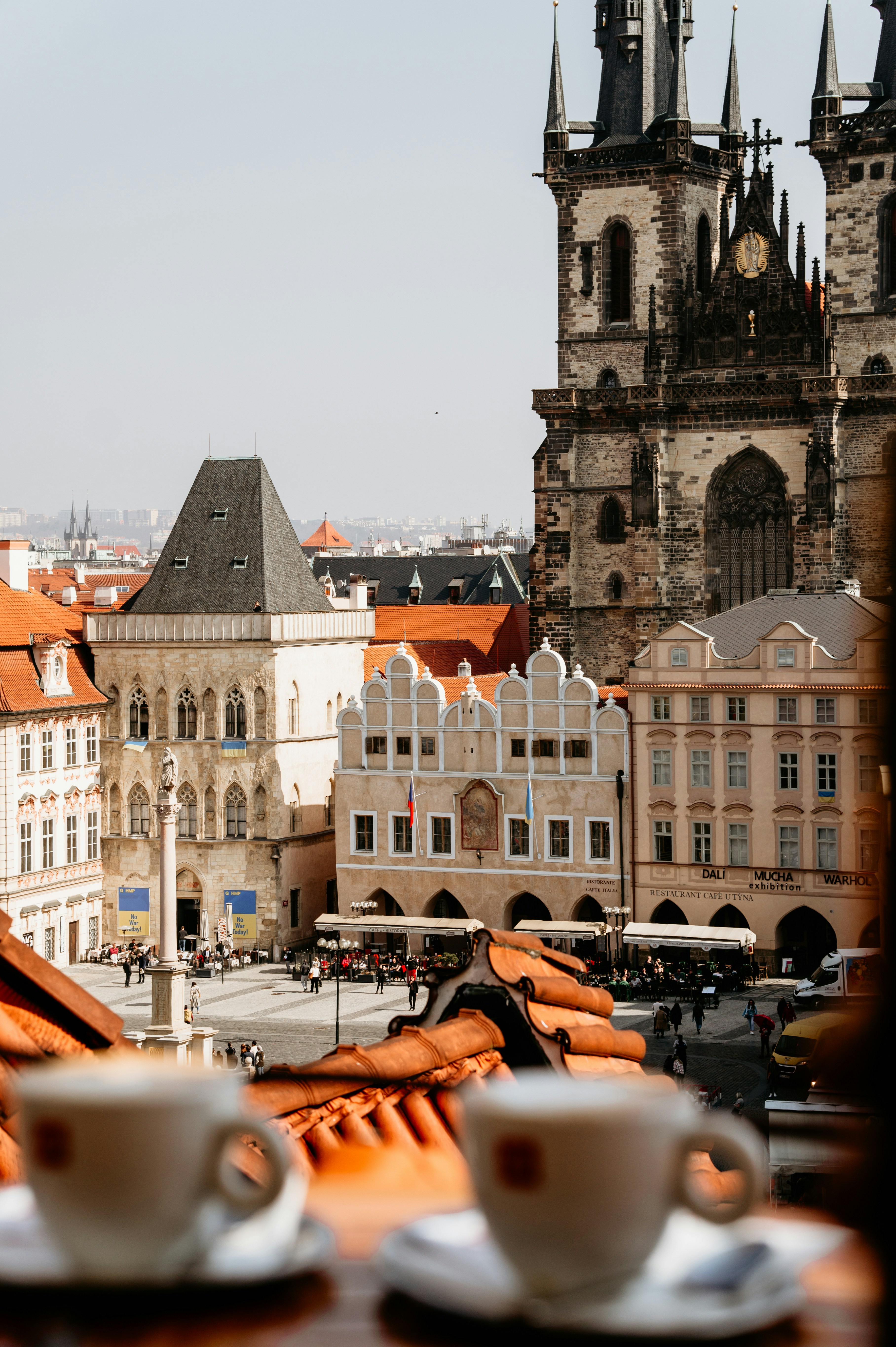 Castle Choir: Rooftops and Towers Over Prague-like Square
