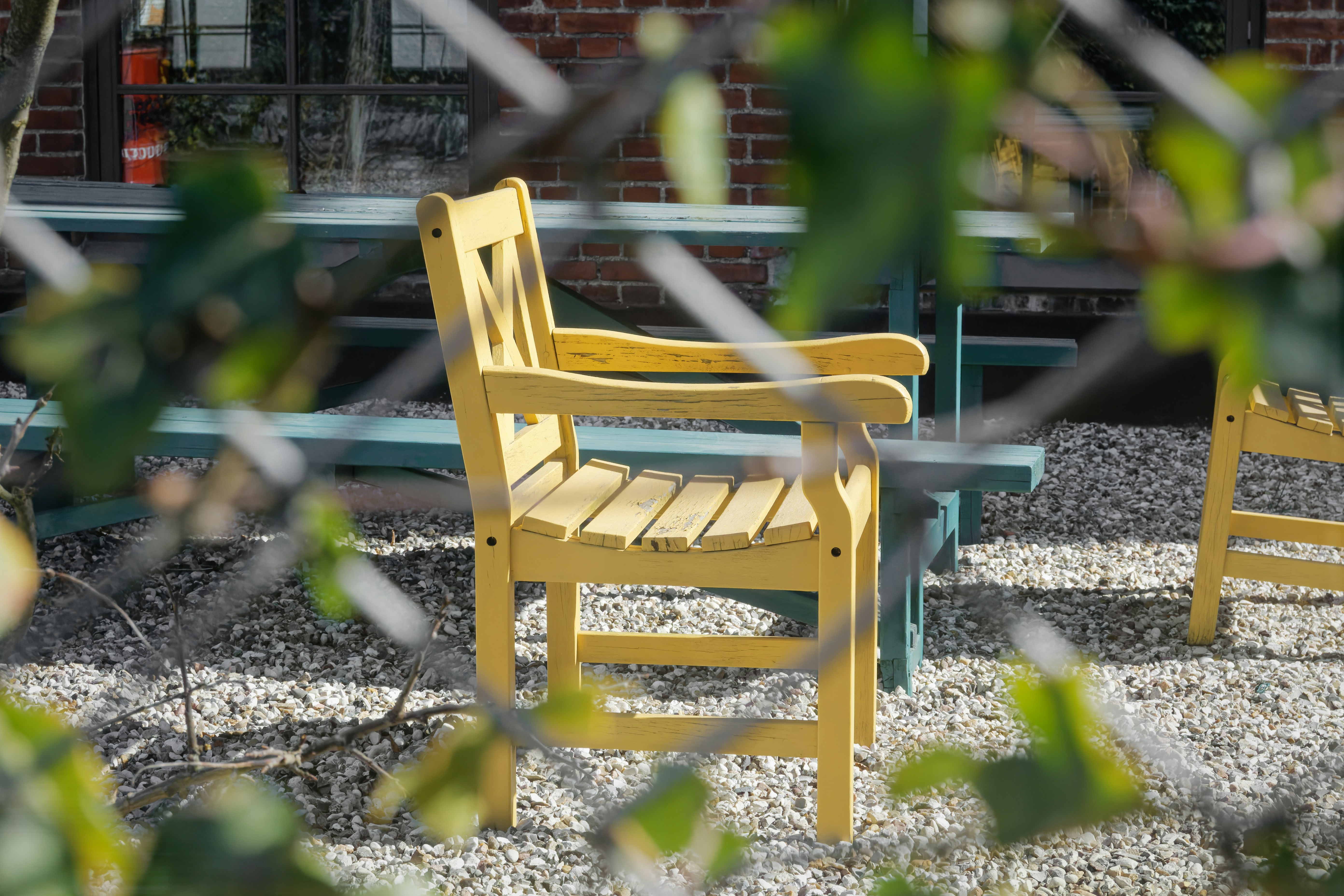 a couple of yellow chairs sitting next to each other