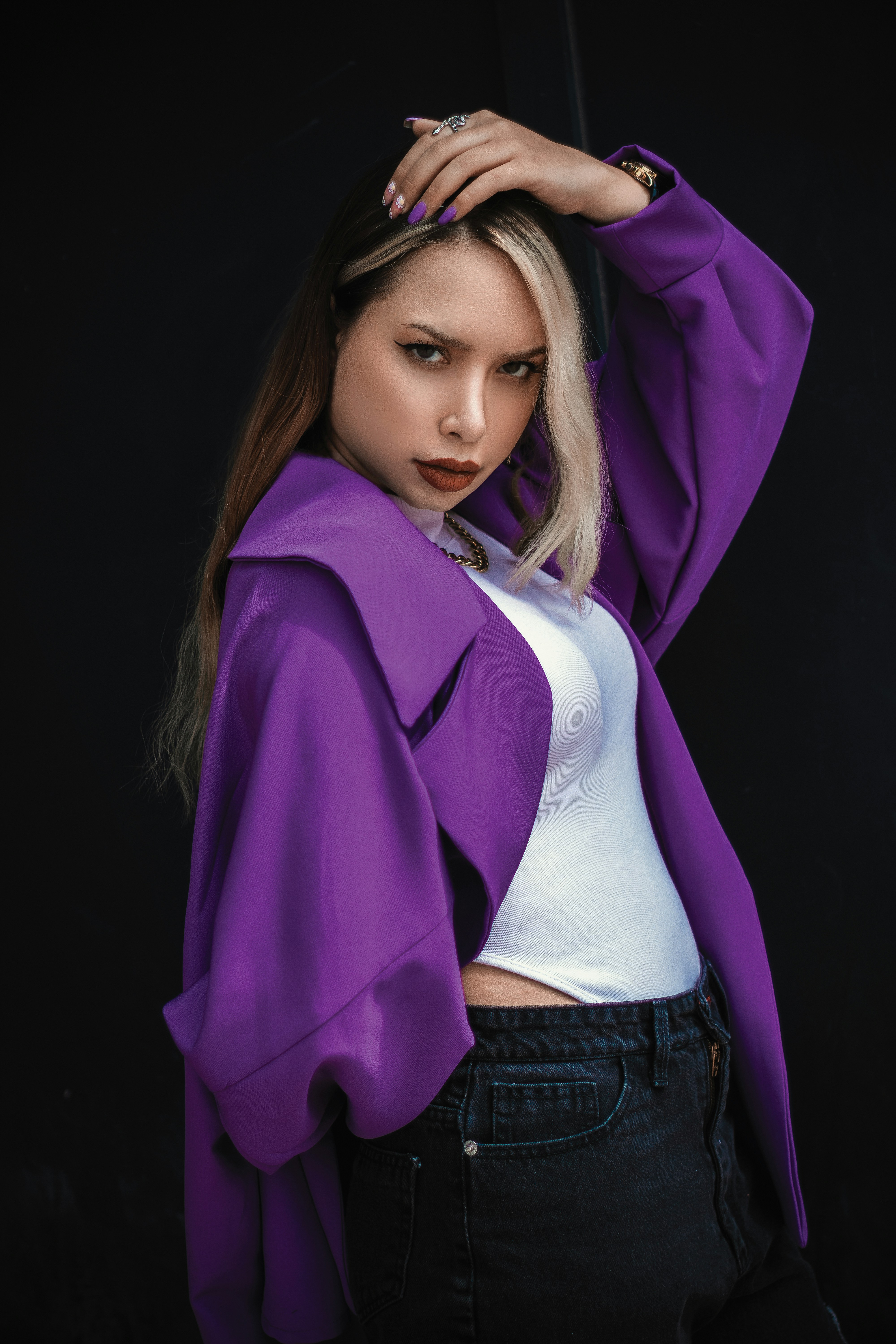 Violet Confidence: A Bold Portrait in a Lavish Purple Coat