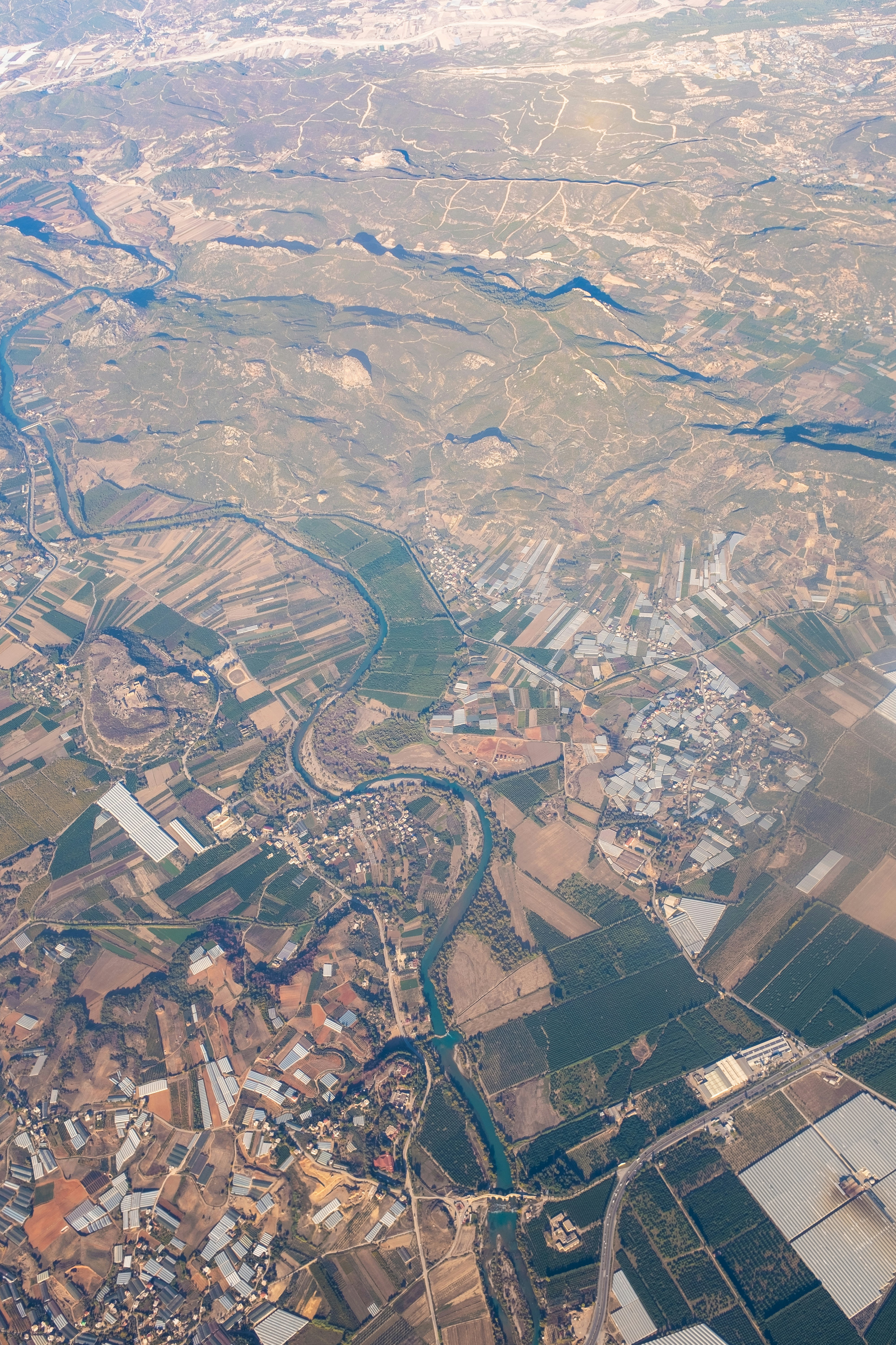 an aerial view of a city and a river