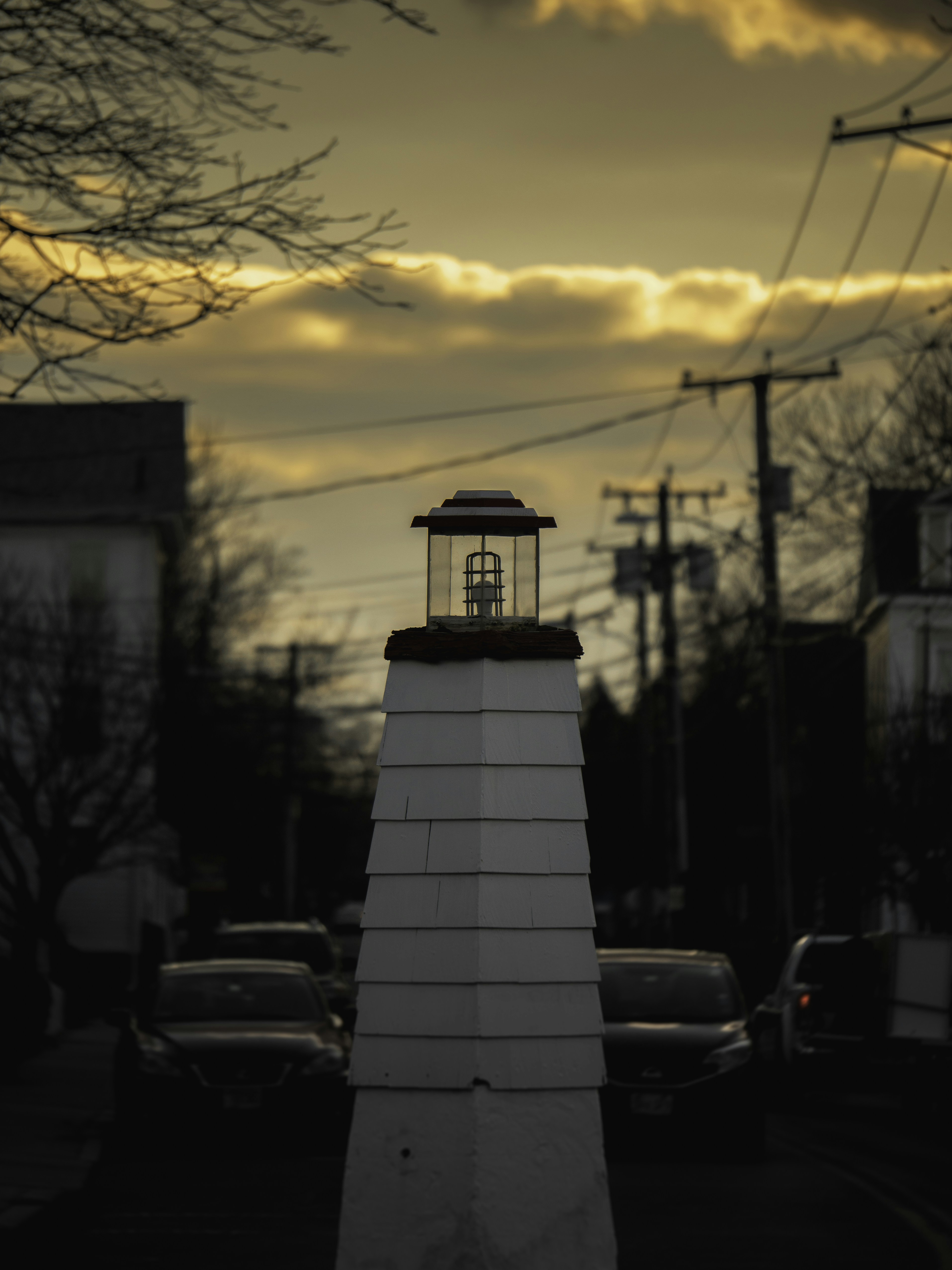 Miniature Lighthouse in the middle of a roundabout.