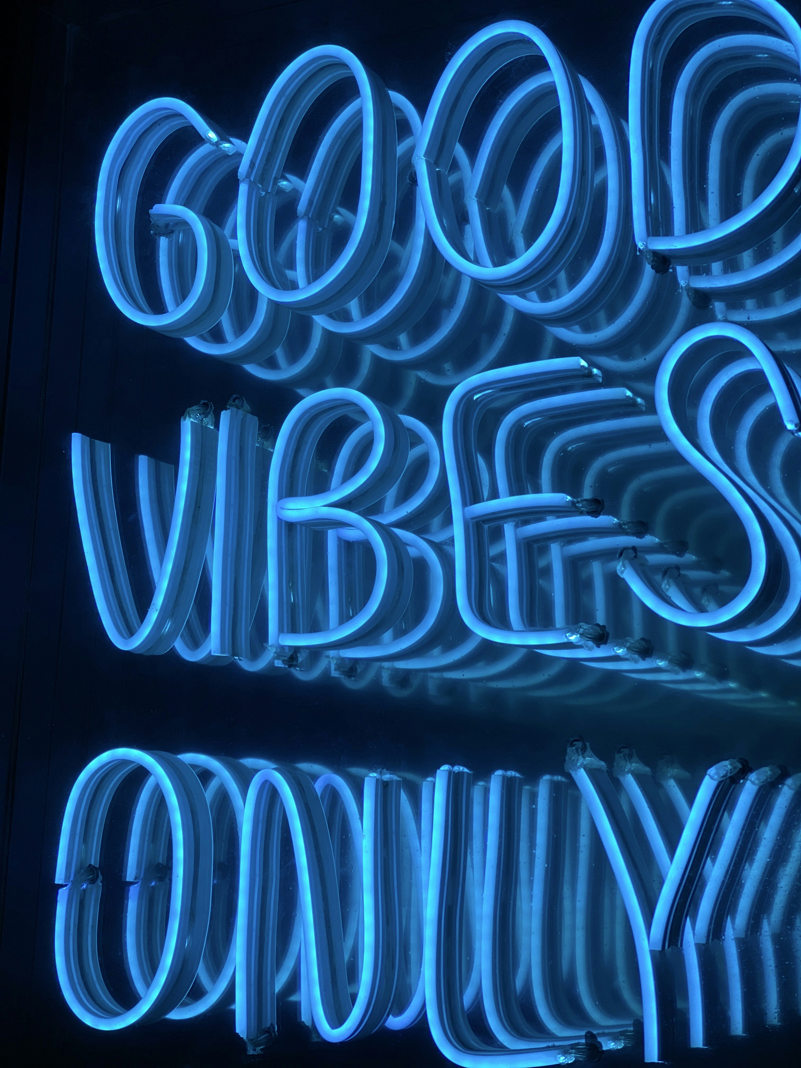 A neon sign that says good vibes only photo – Free Blue Image on Unsplash