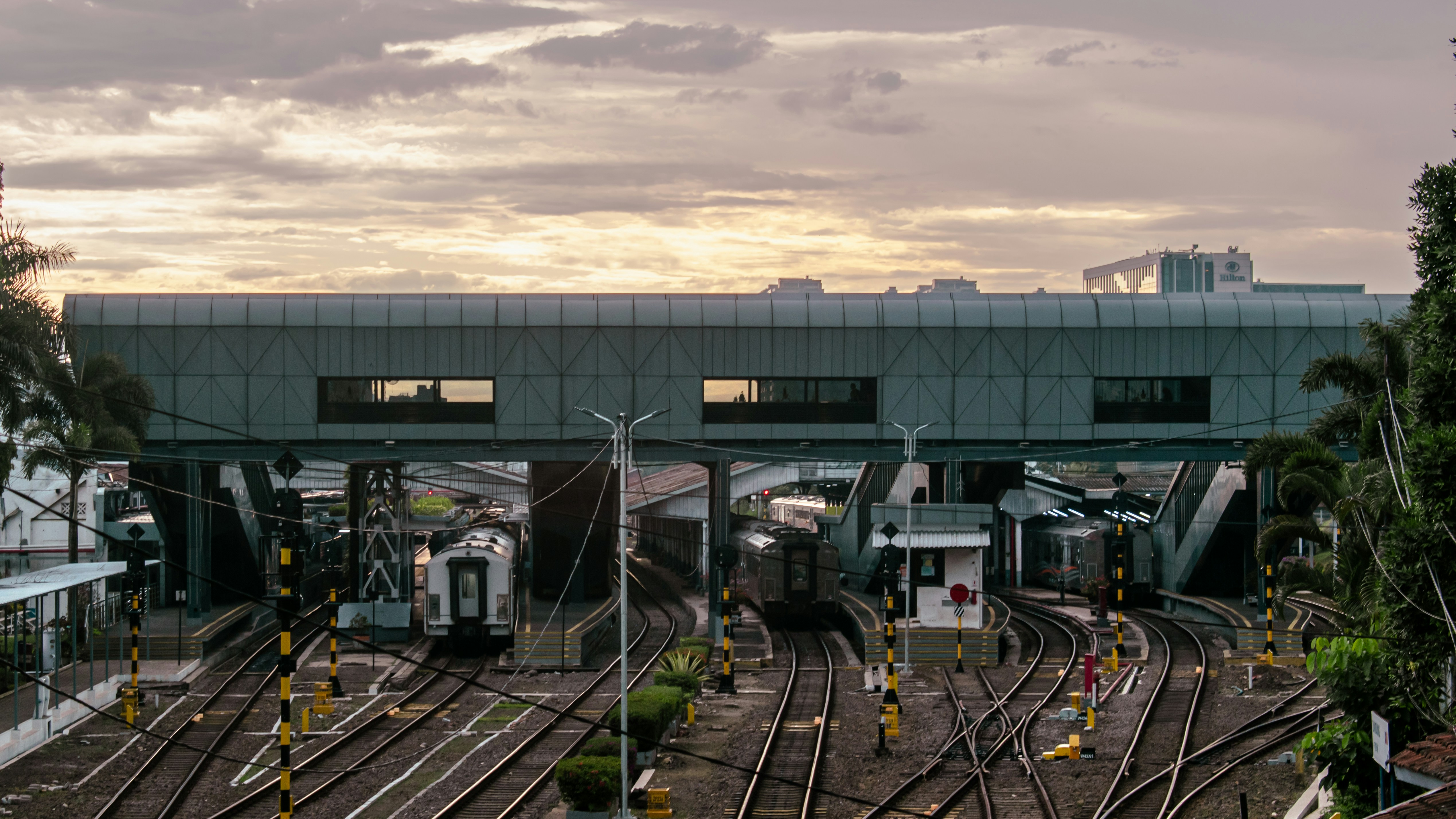 a train station with a train on the tracks