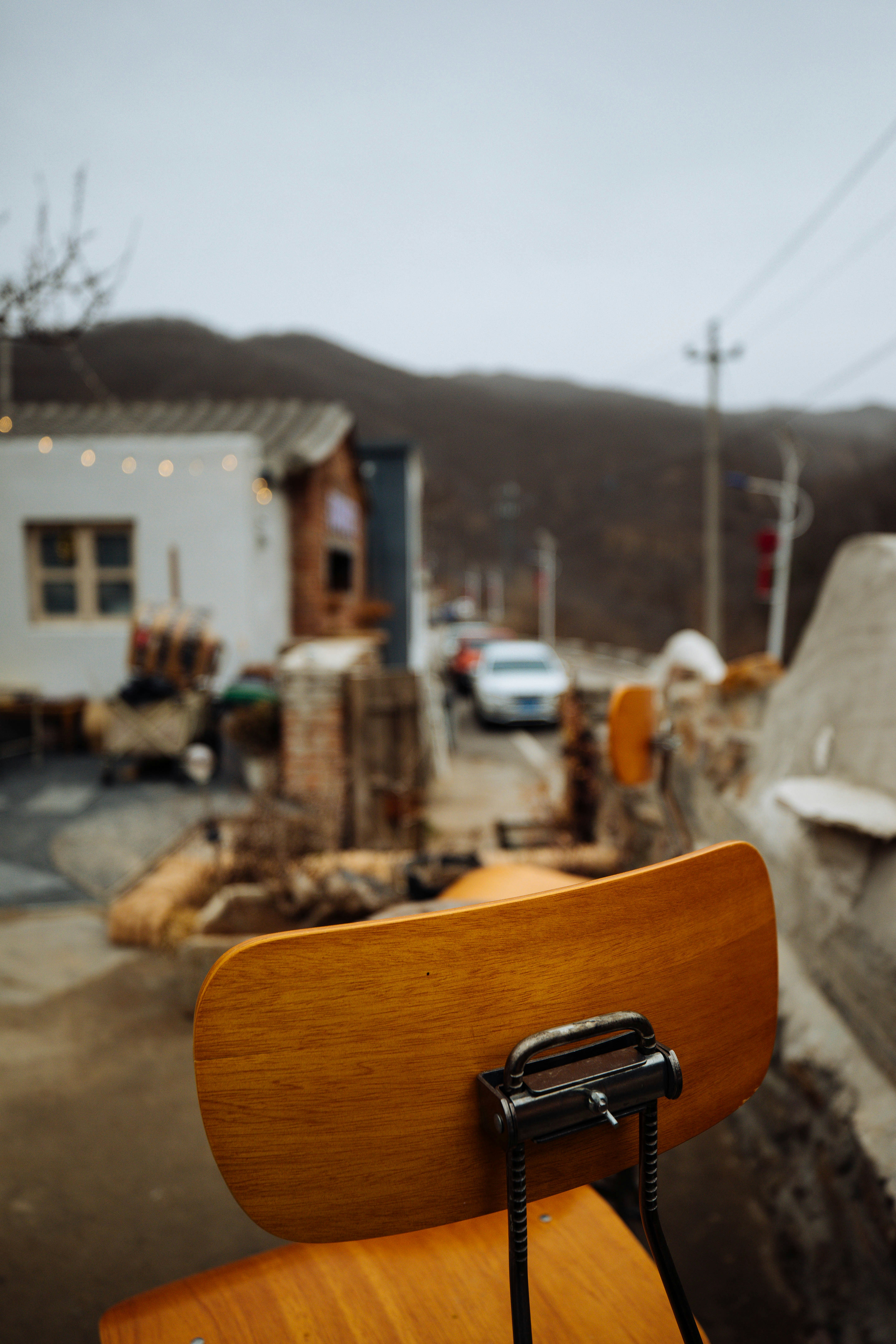 Wooden Chair in a Rustic Village Scene