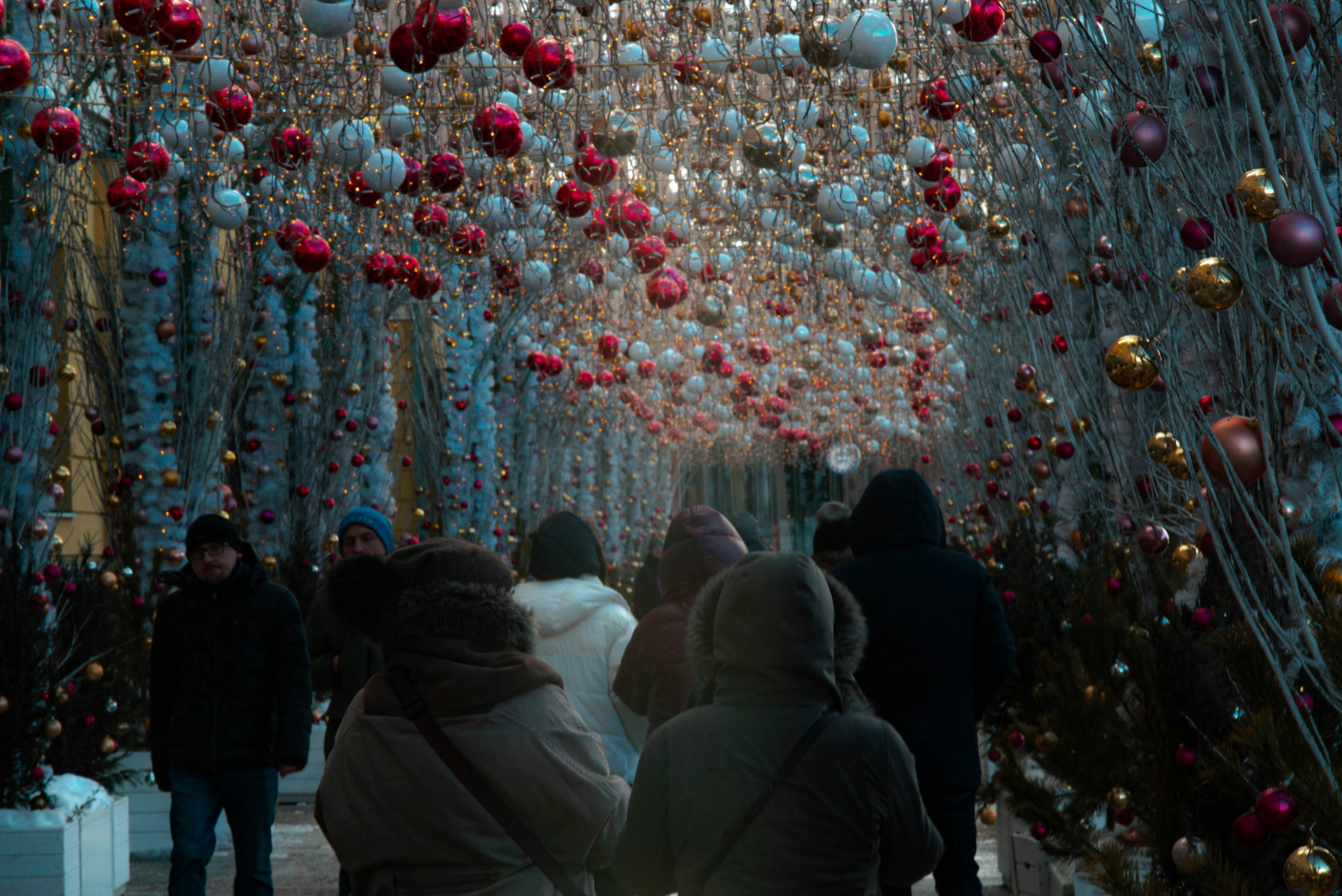 Ornamented Tunnel: A Winter Stroll Beneath a Sky of Baubles
