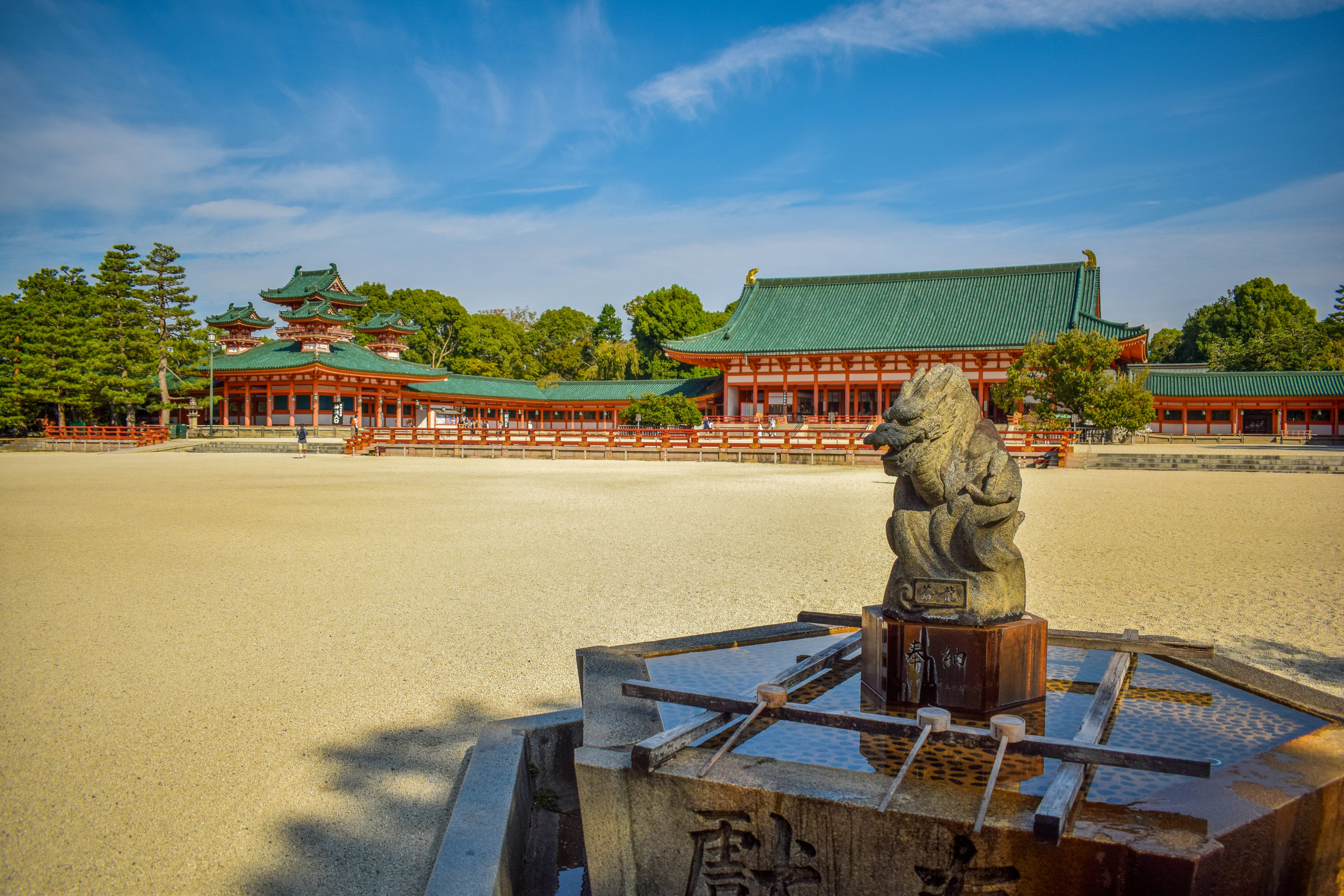 A statue of a bear in front of a building photo – Free Temple Image on ...