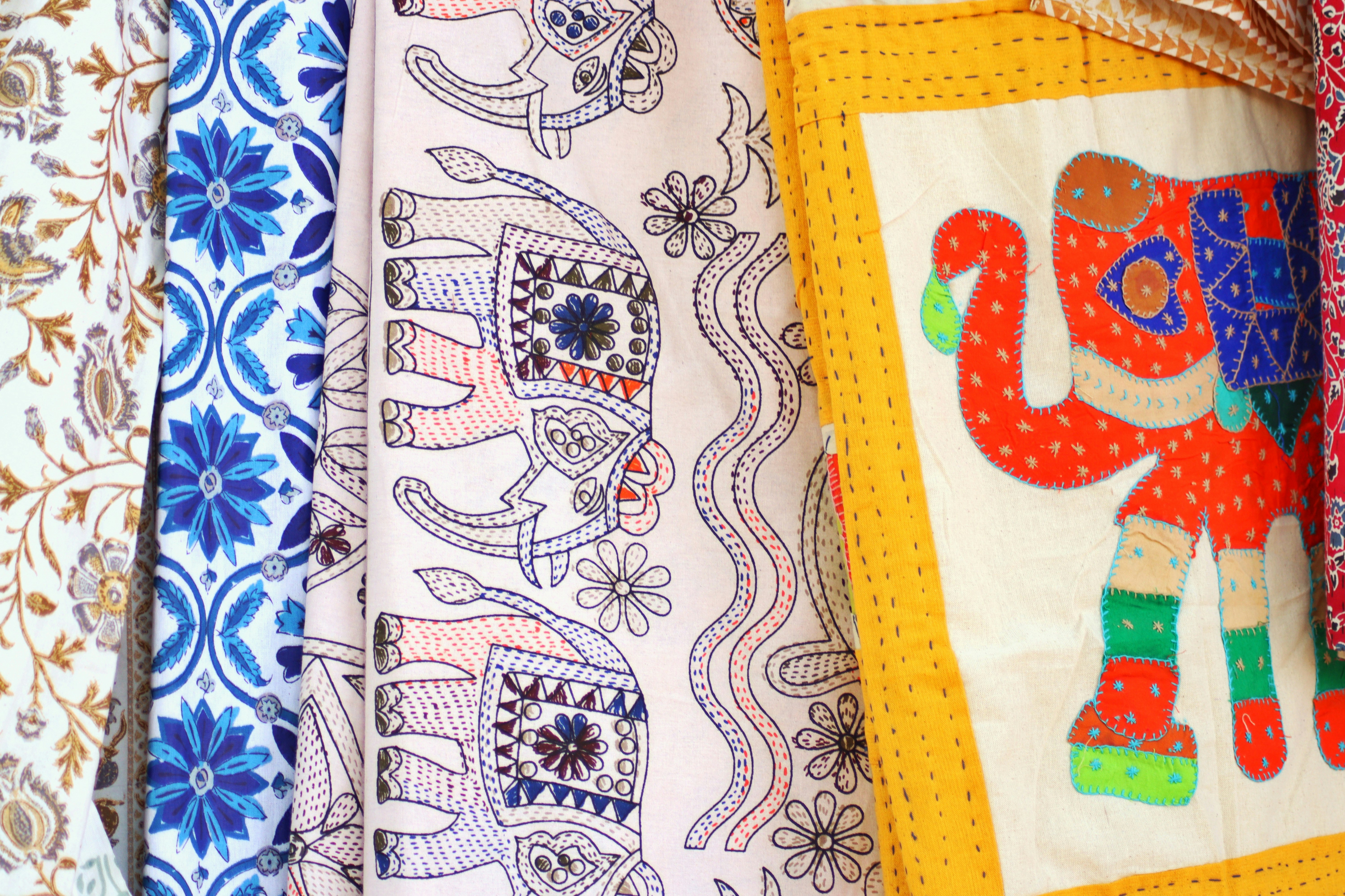 Patchwork Elephant Frieze: Stitchwork Portrait on a Colorful Quilt