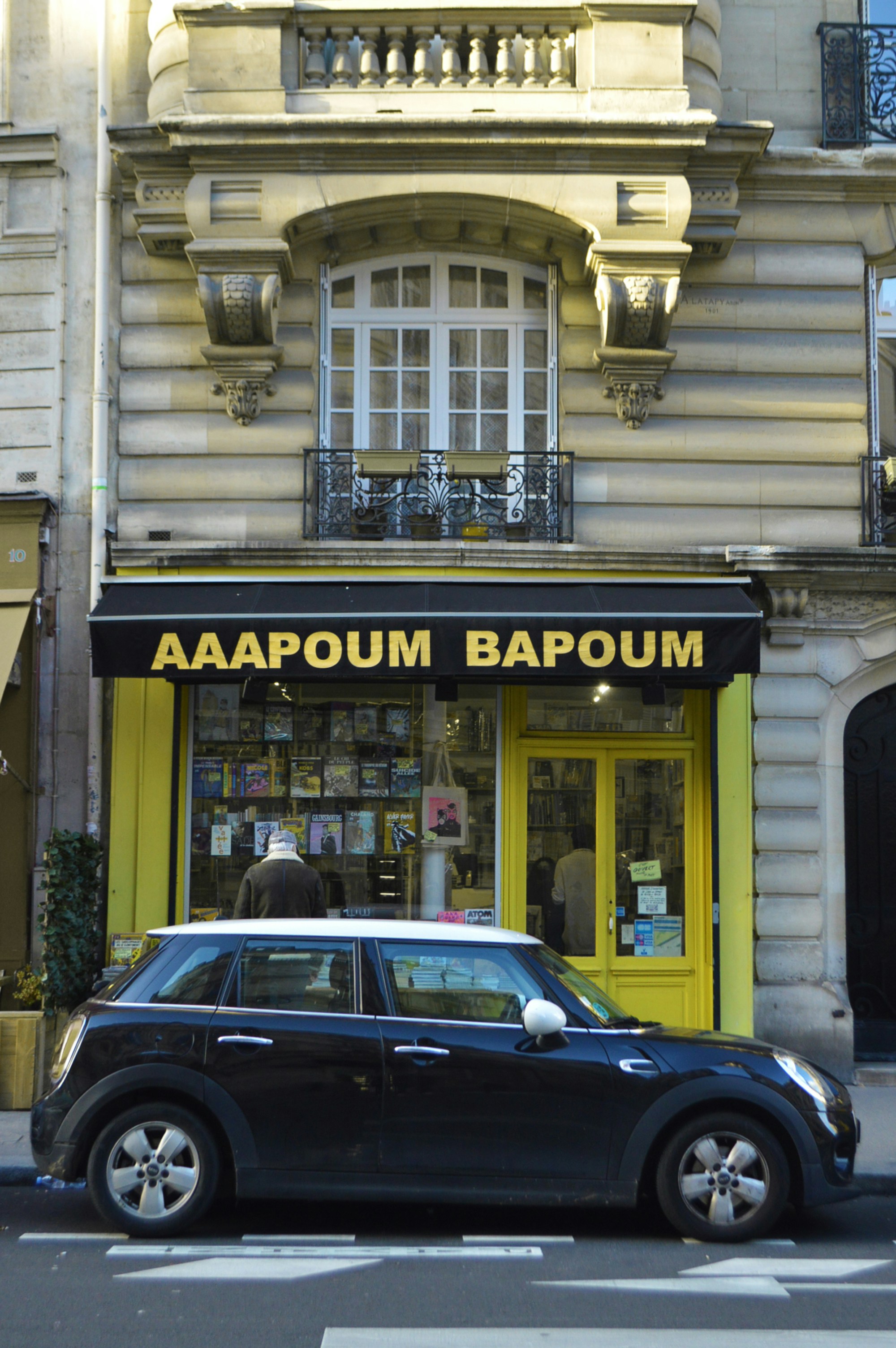 a car is parked in front of a store