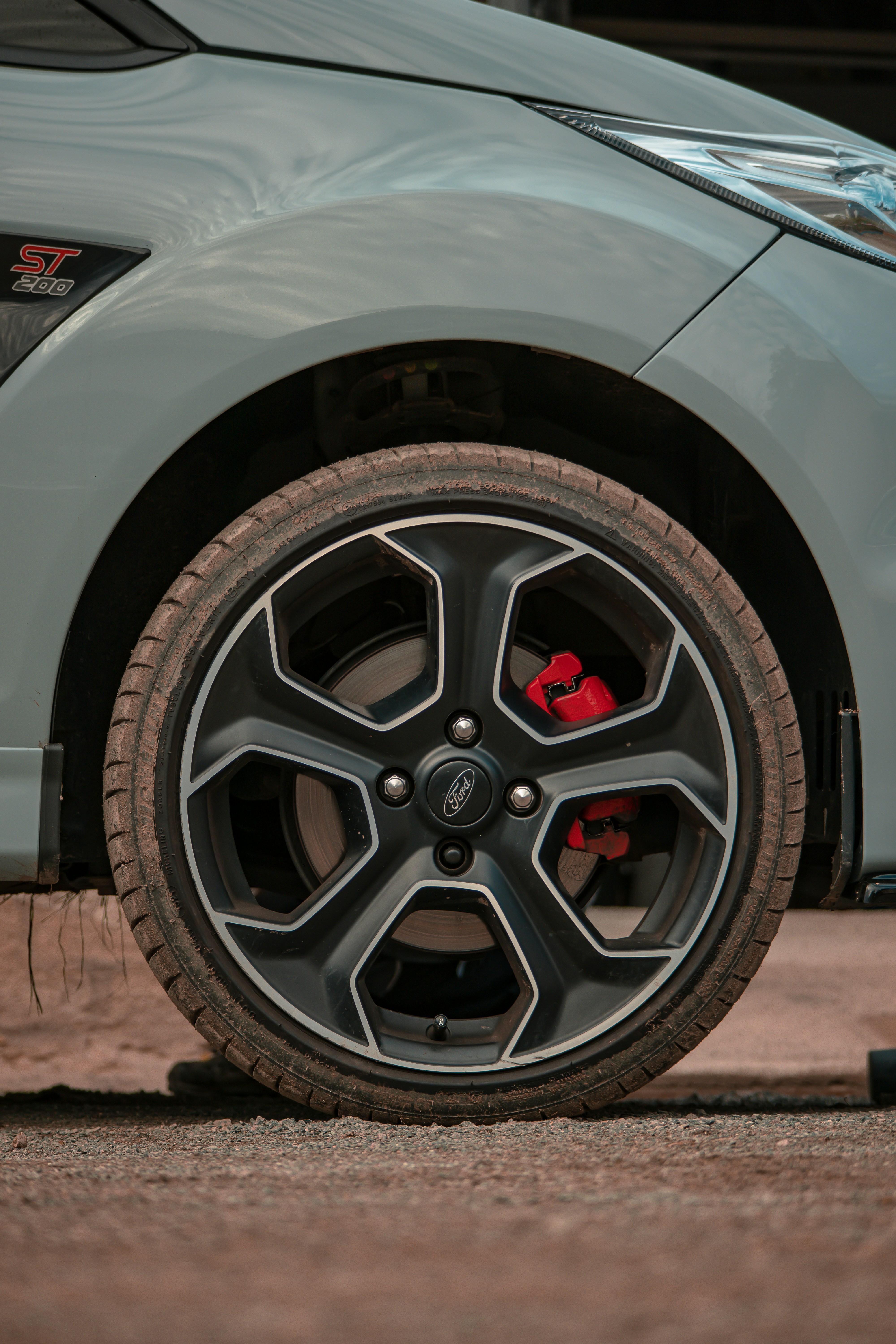 Blue Ford ST Close-Up: Hex-spoke Alloy Wheel and Red Calipers