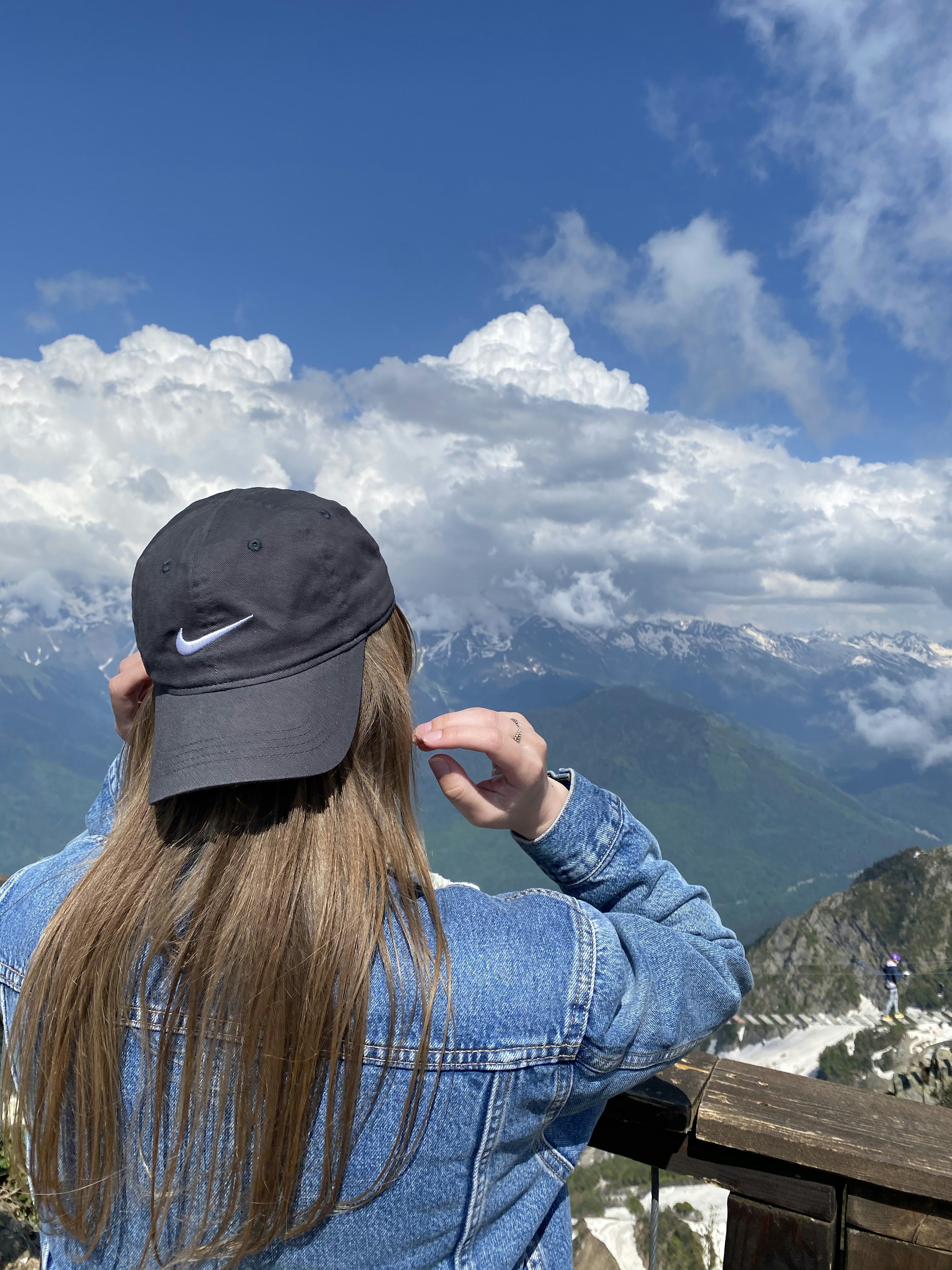Denim at the Edge: Facing a Snow-Dusted Ridge