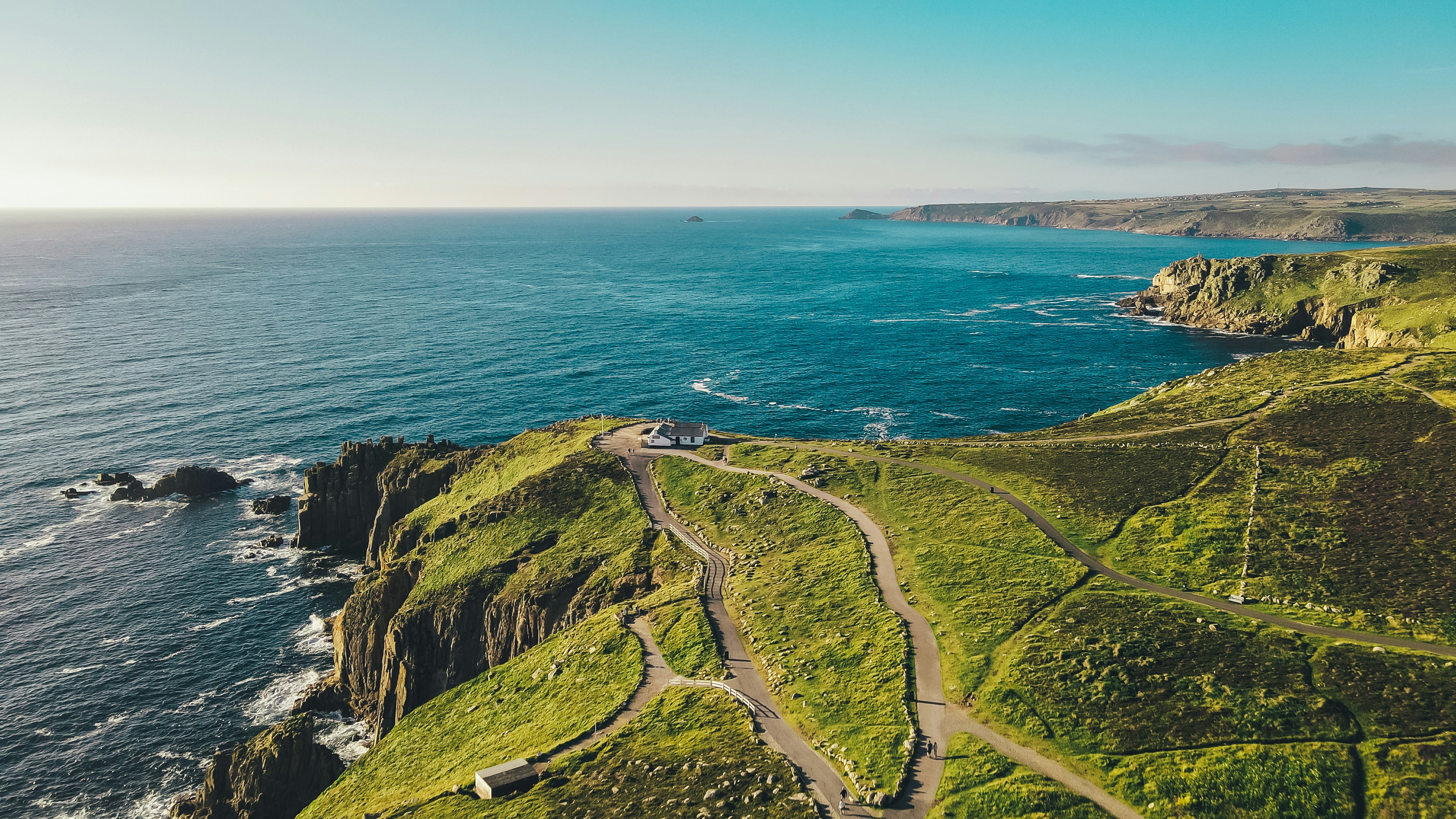 An aerial view of a road near the ocean photo – Free United kingdom ...