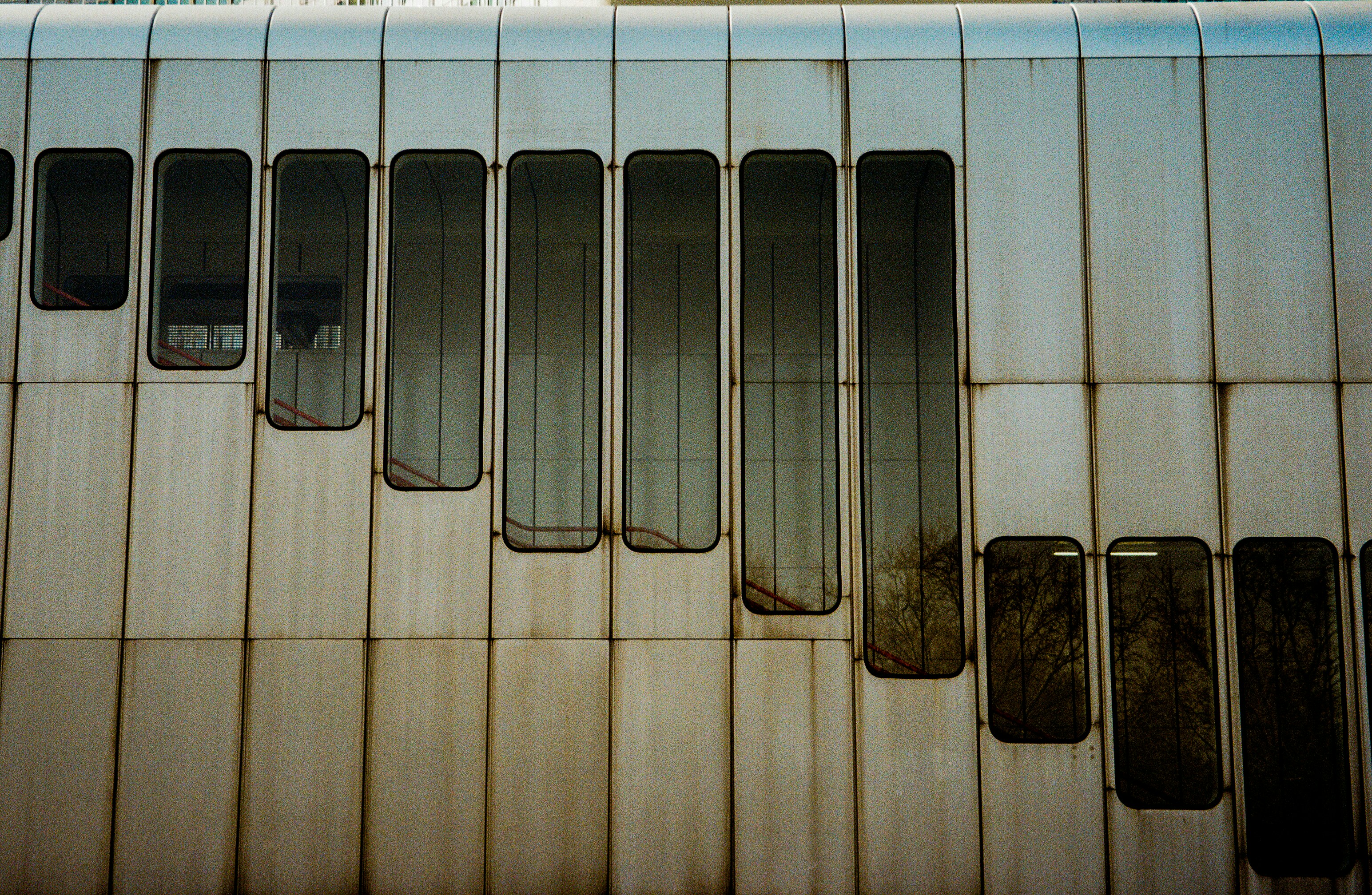A close up of a building with many windows photo – Free 70s Image on ...