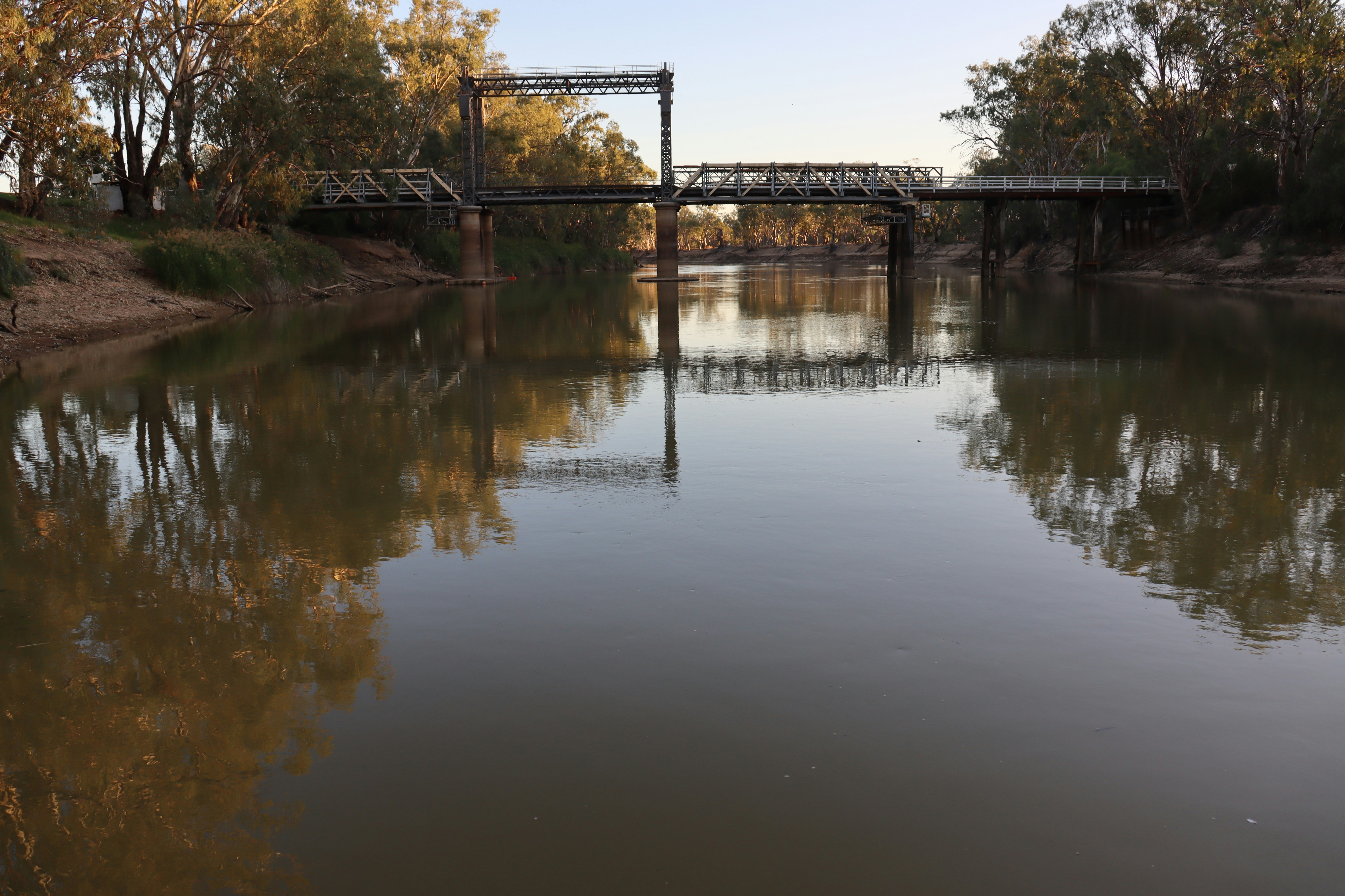 Bridge over Quiet River: Reflections and Golden Light
