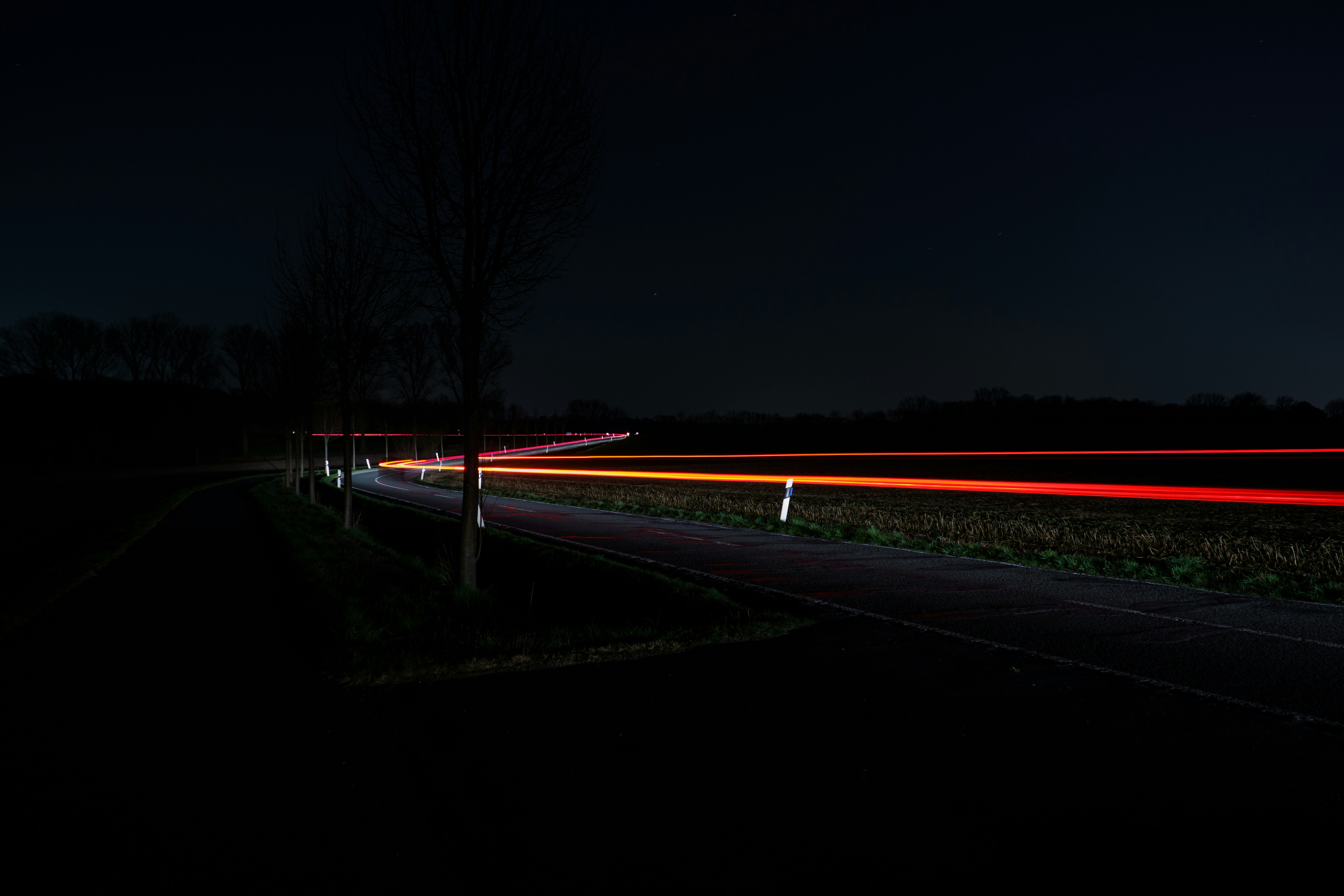Echoes on the Road: Long-Exposure Night Trails Across a Quiet Rural Route