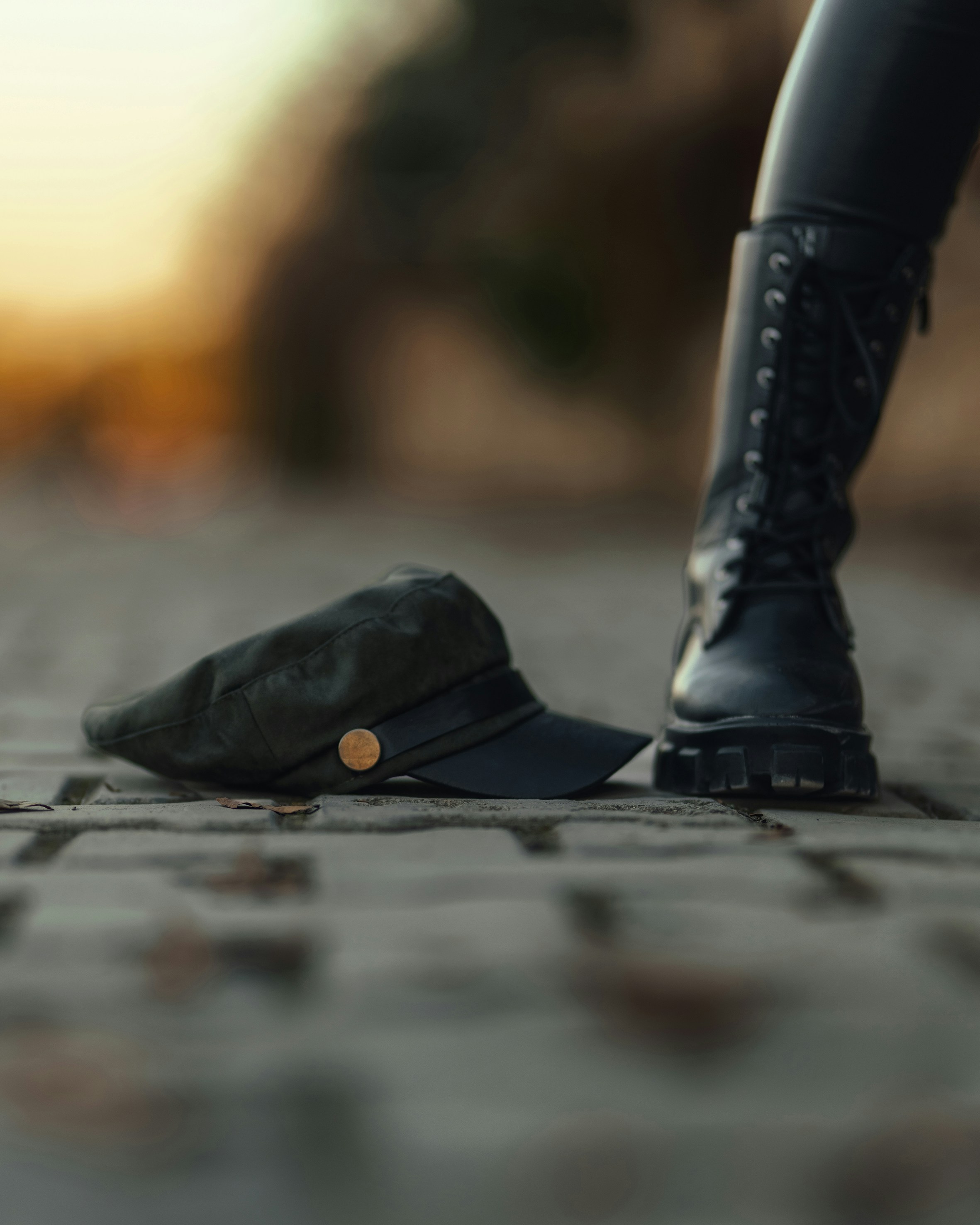 Rugged Boots at Dusk: A Quiet Statement by the Cobblestones