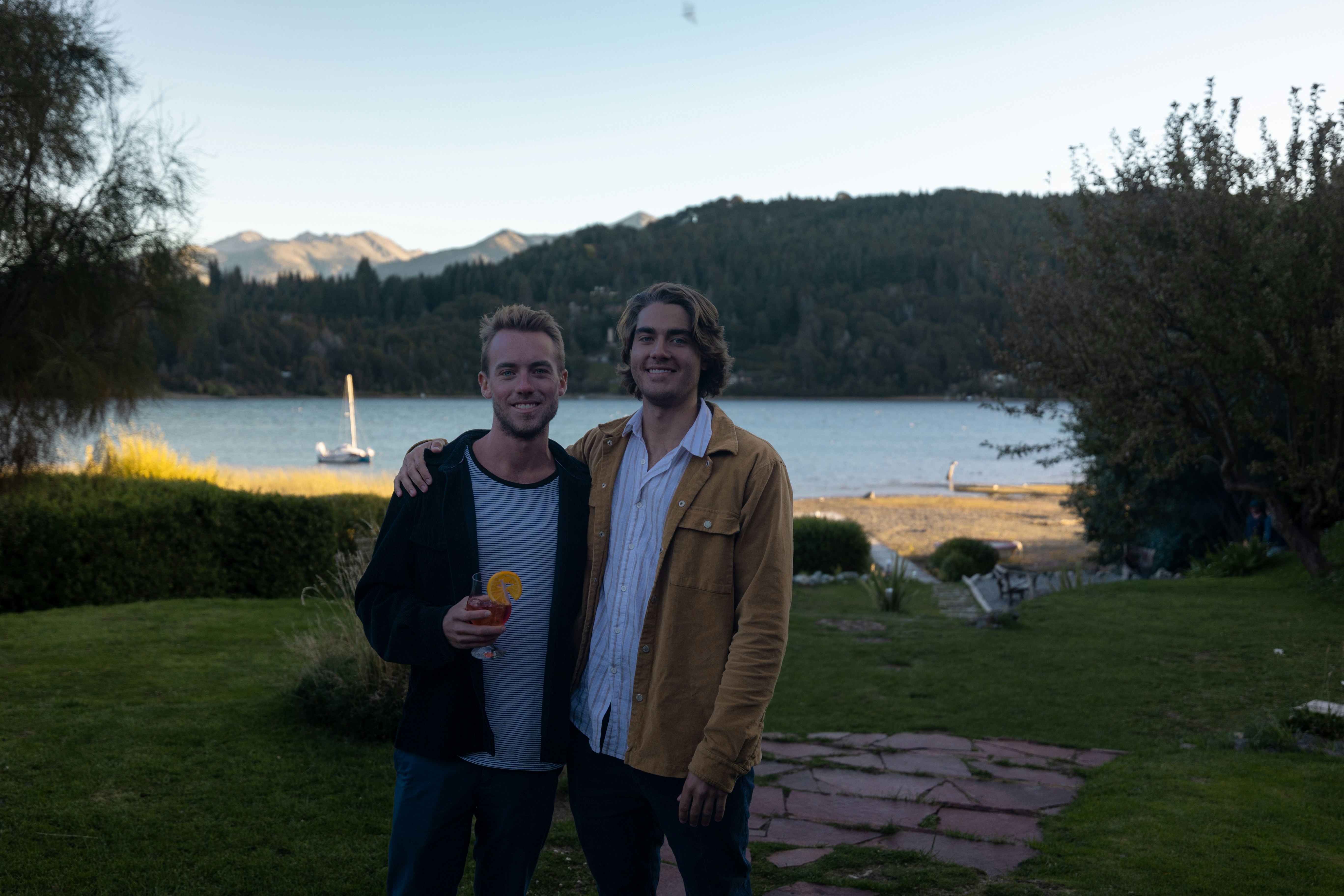 Two men standing together photo – Free Clothing Image on Unsplash