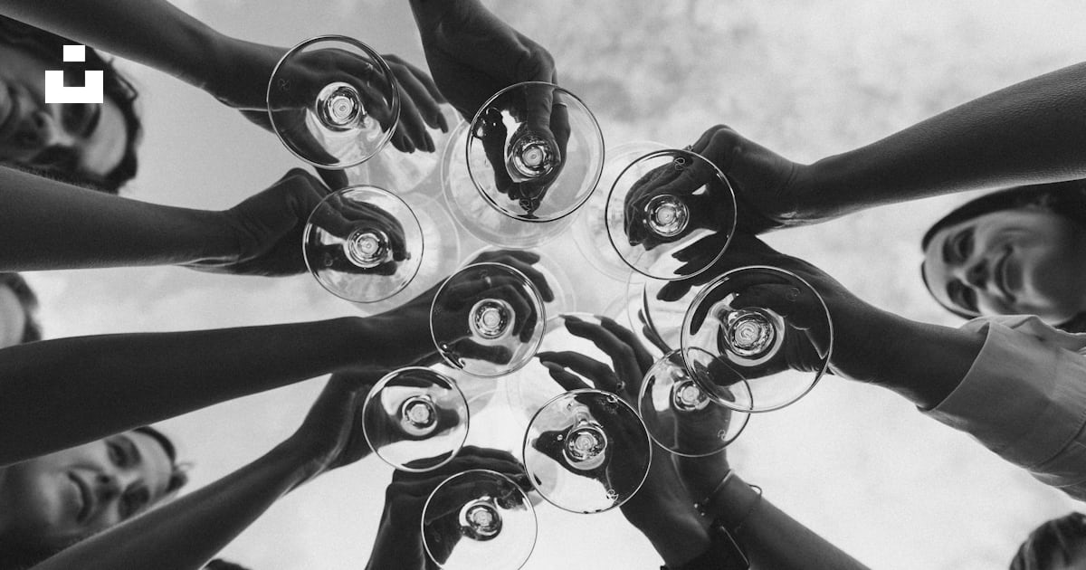 A Group Of People Holding Wine Glasses Photo Free Grey Image On Unsplash