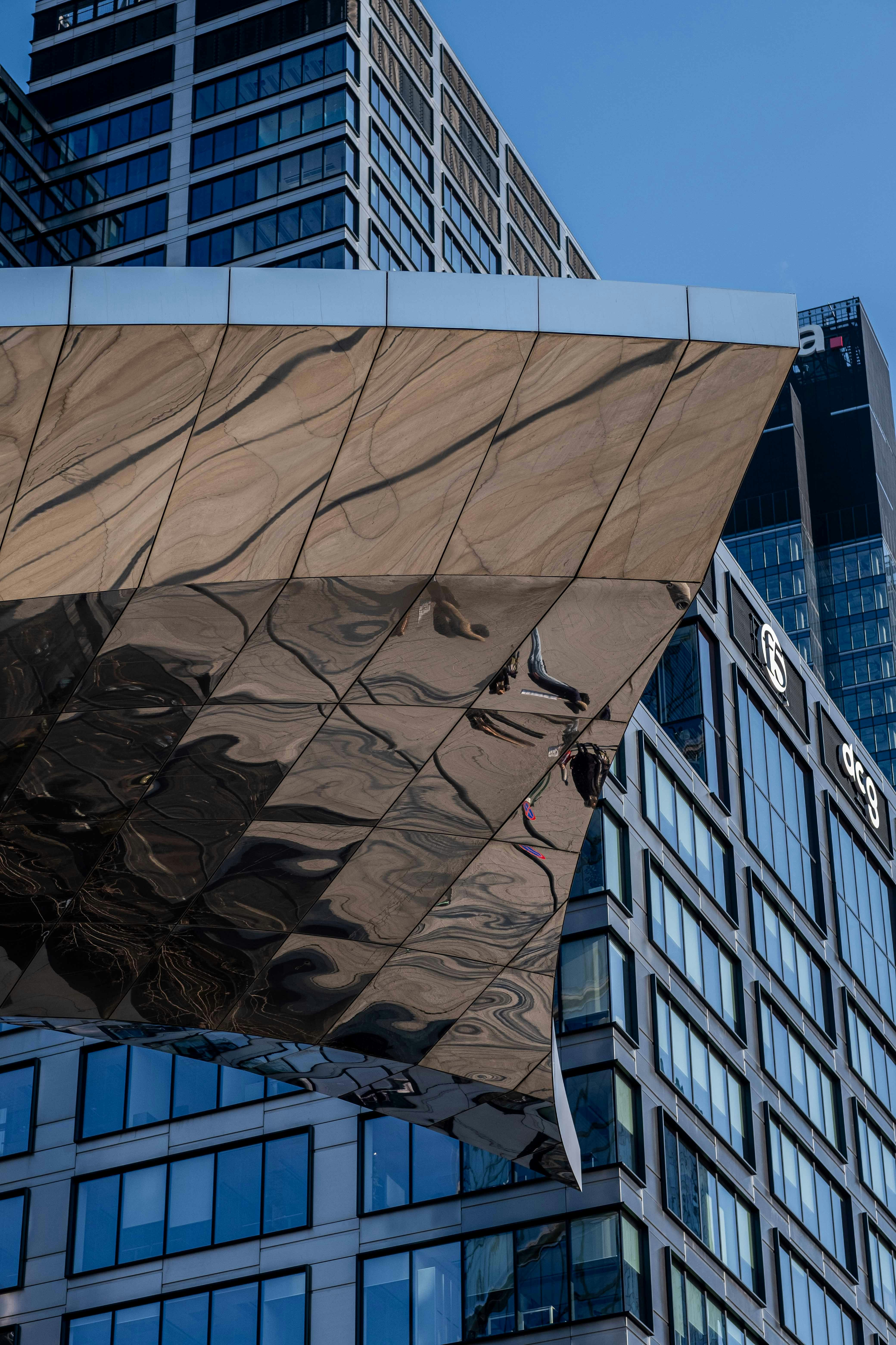 A building with a triangular roof photo – Free Skyscrapers Image on ...