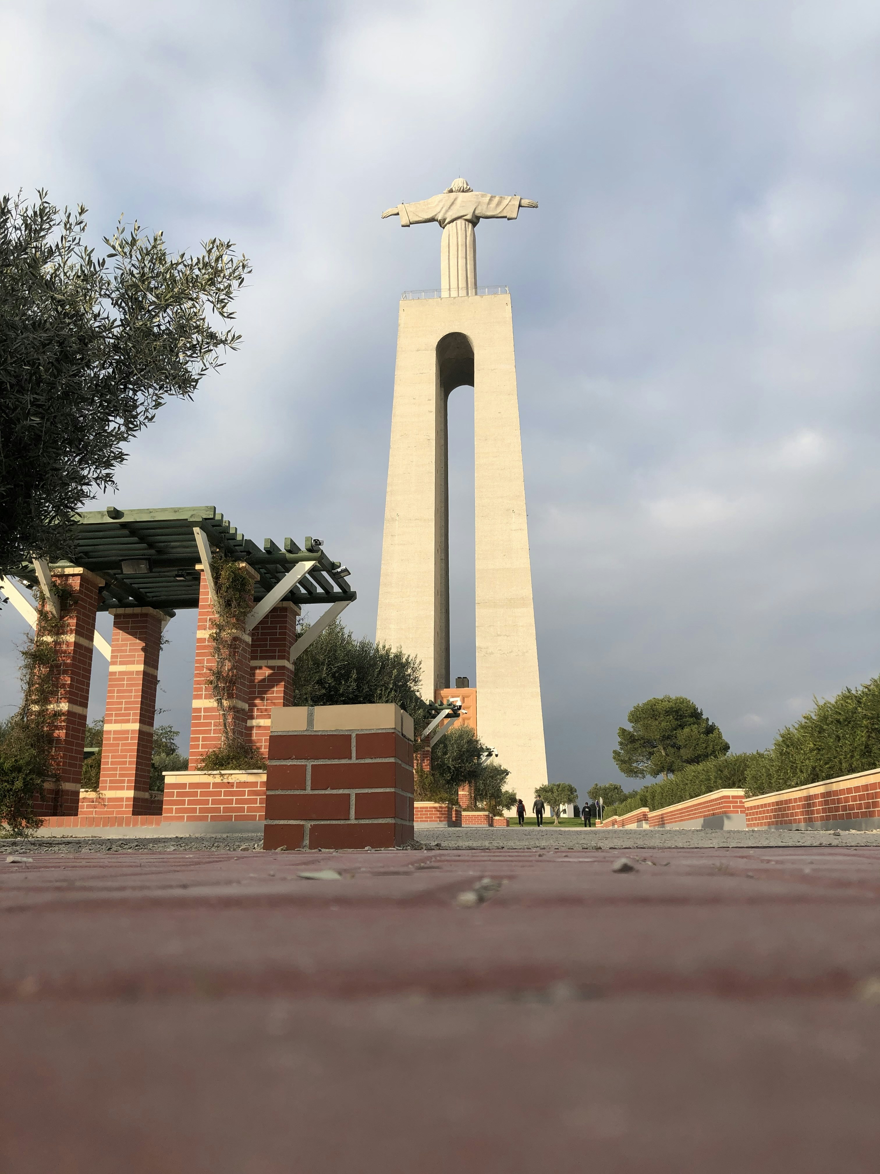 A tall tower with a cross on top photo – Free Monument Image on Unsplash