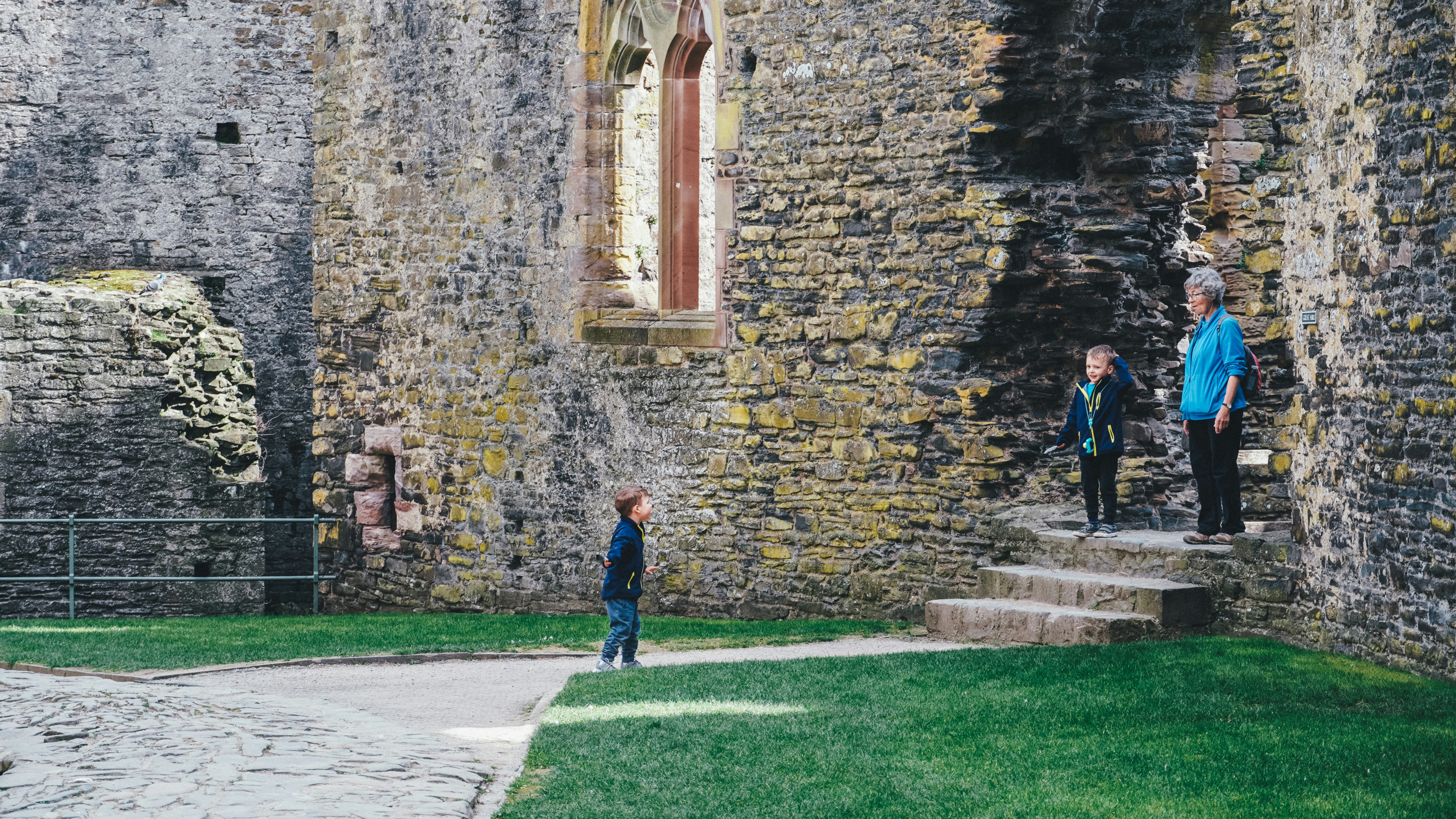 A group of people standing outside a building photo – Free Castles ...