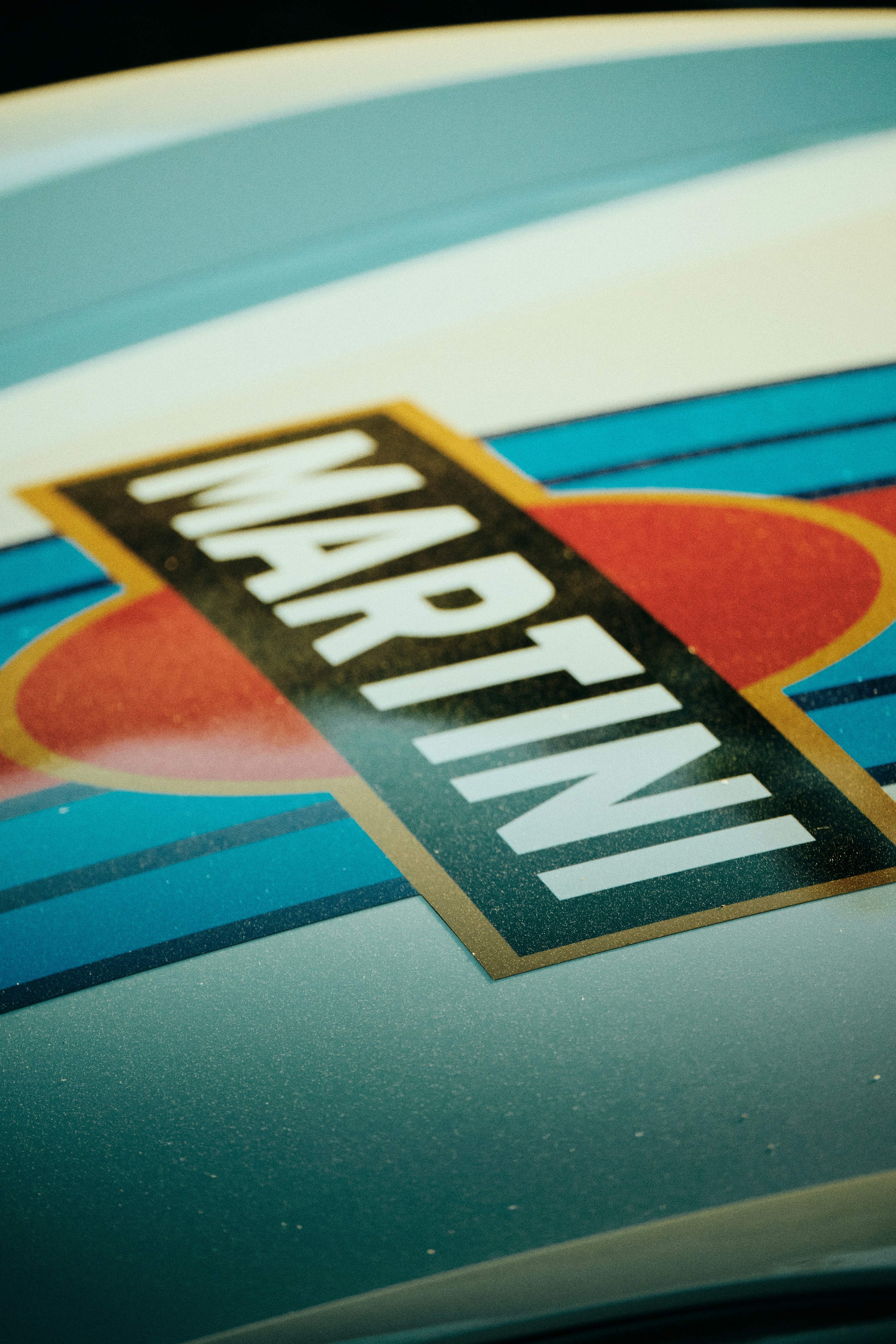 Martini Motorsport Emblem: A Close-Up on Speed and Color