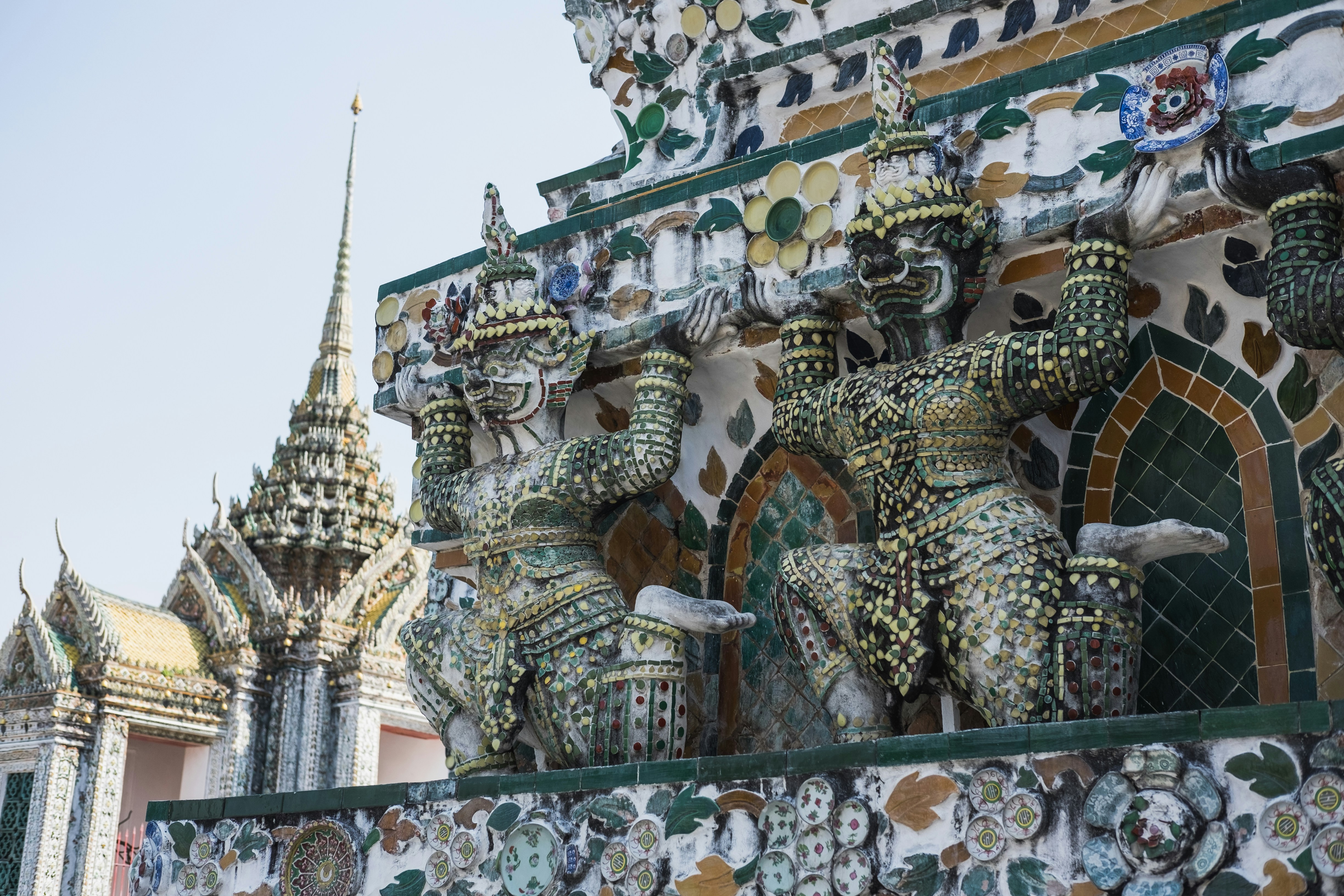 Guardians of Mosaic Armor: A Thai Temple Facade in Color