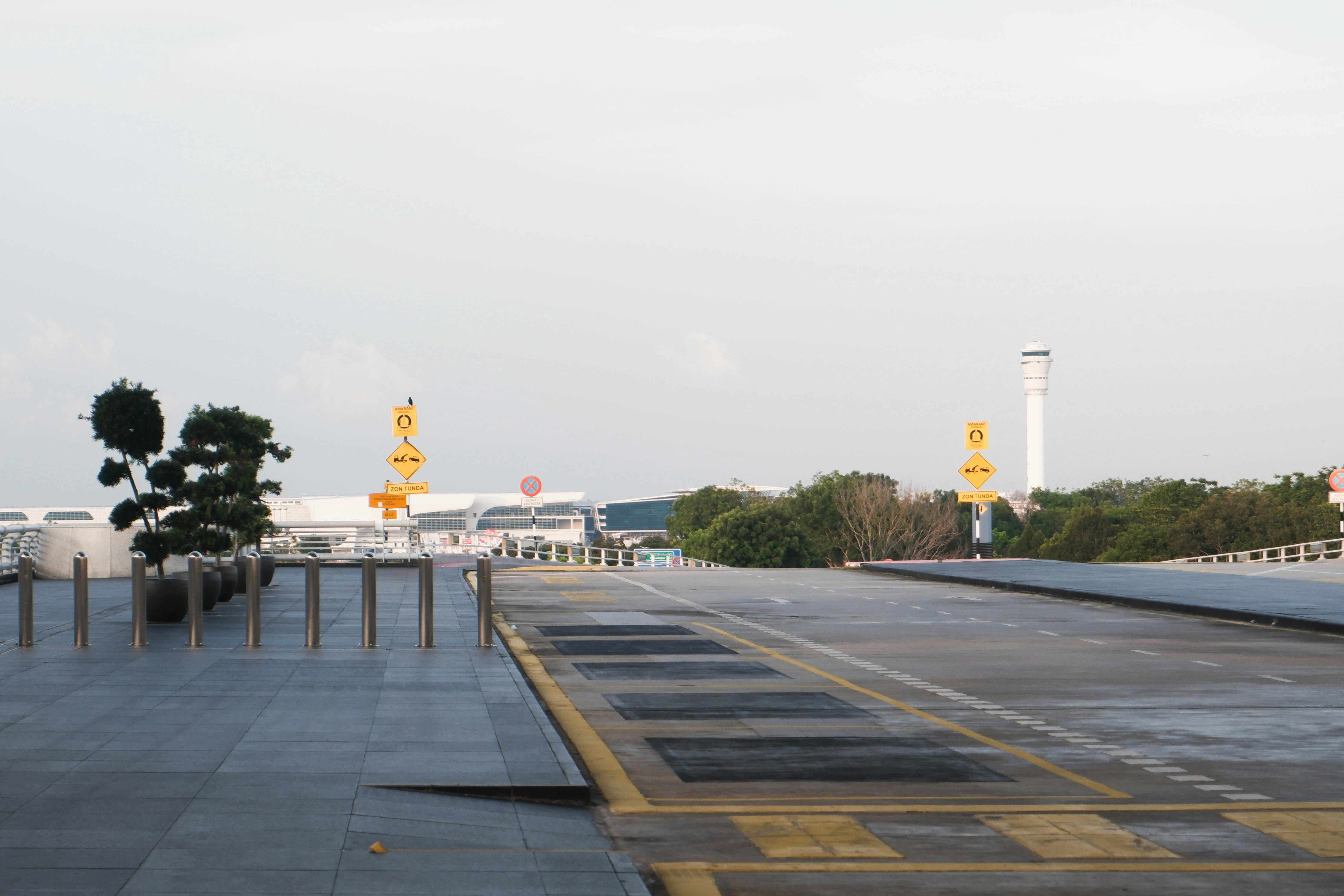 Converging Lines Toward a Distant Tower on a Quiet Pier