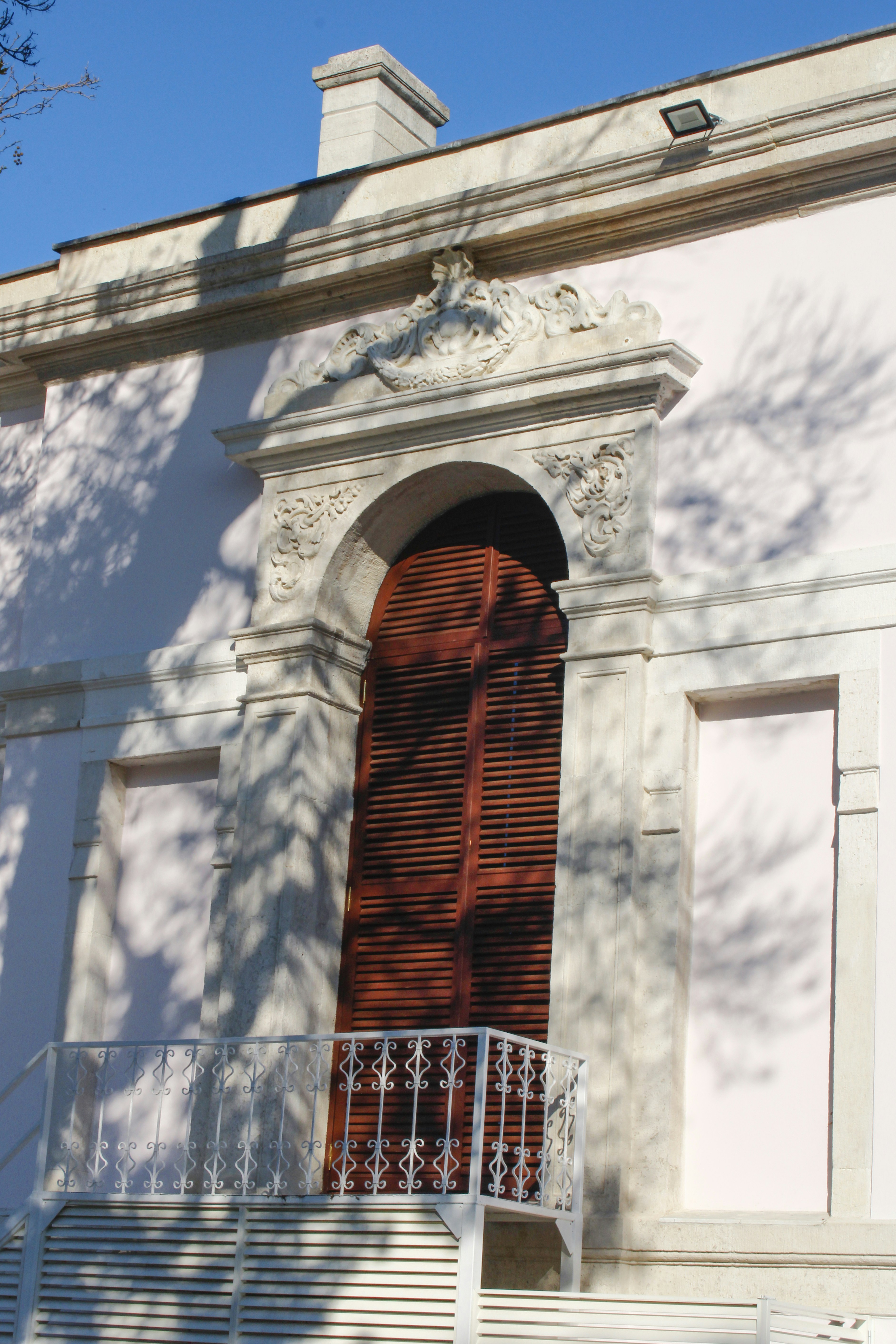Dappled Light on a Neoclassical Archway