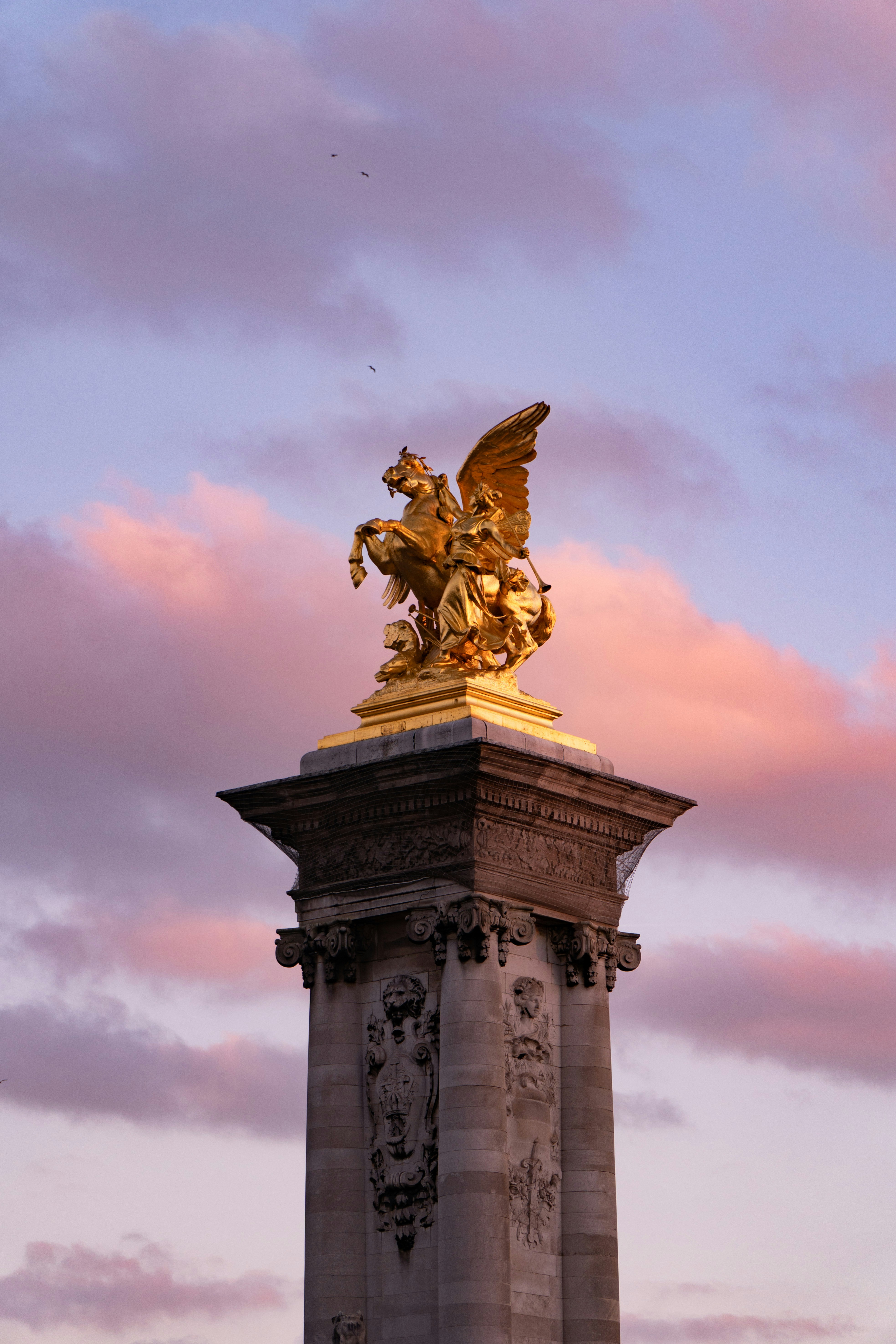 A golden statue on top of a tall pillar photo – Free Paris Image on ...