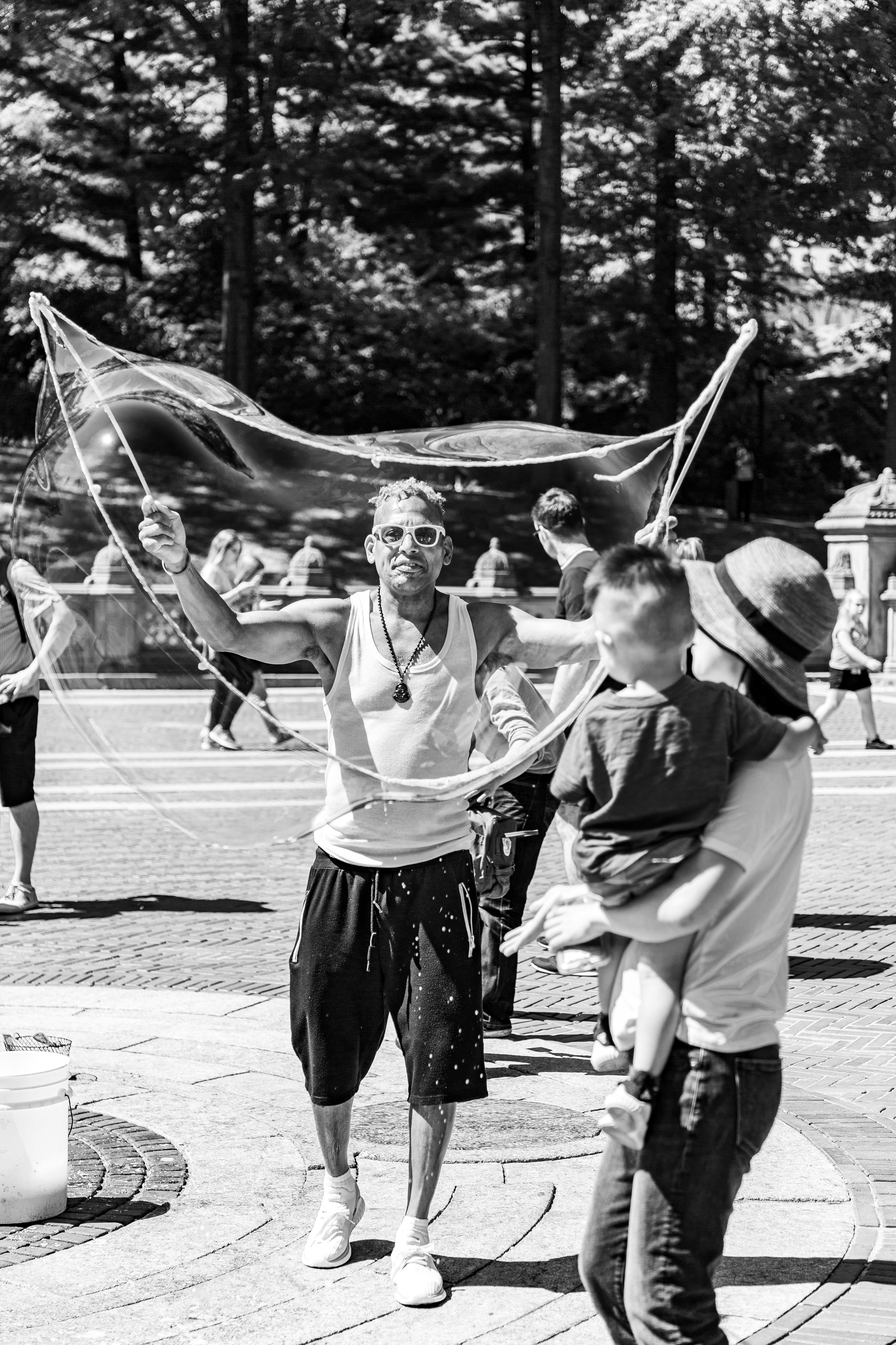 Center-Stage Bubble Dance on a City Plaza