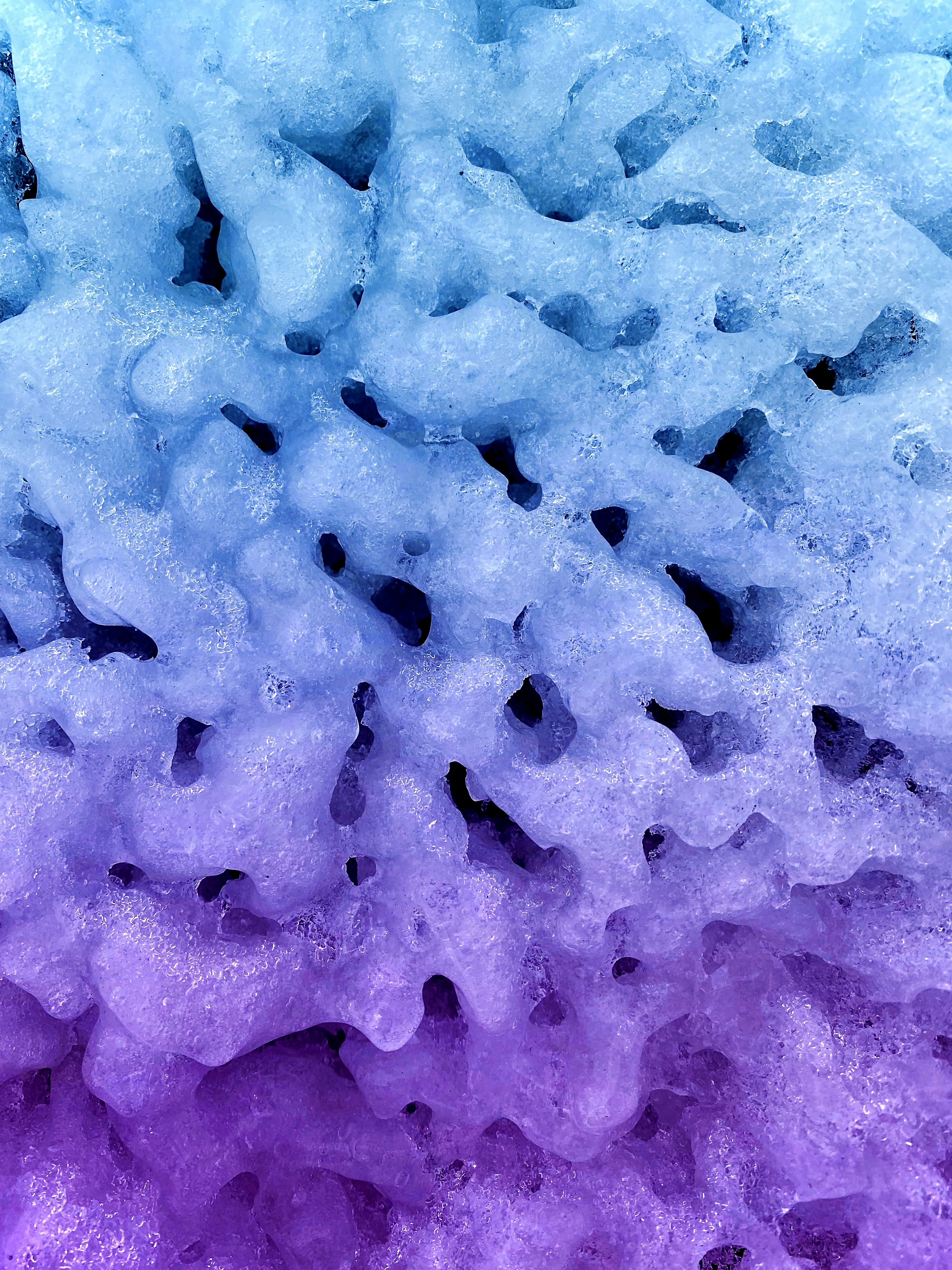 a close up of a purple and blue substance