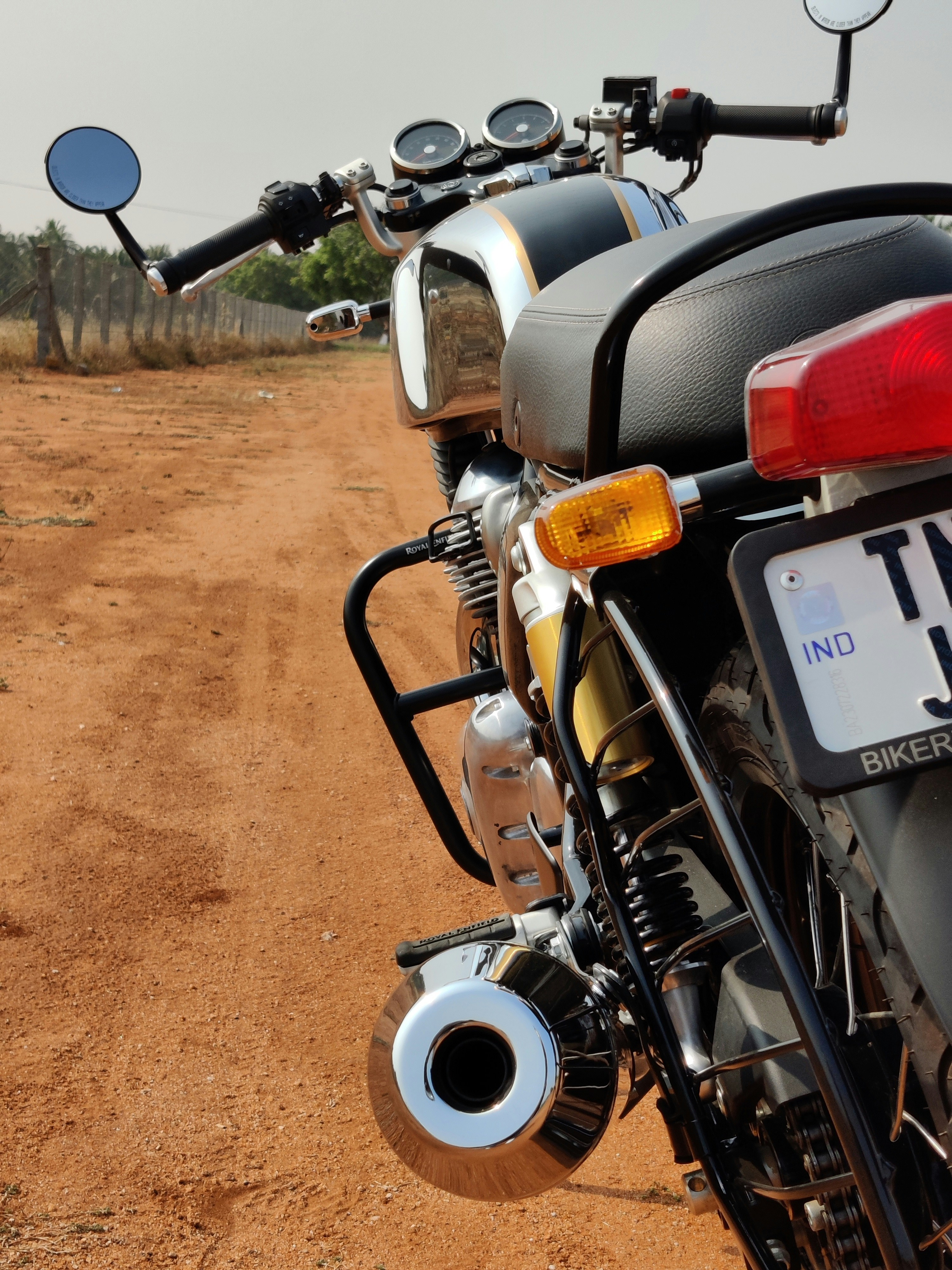 Continental GT 650 Mr Clean Motorcycle | a motorcycle parked on the side of a dirt road