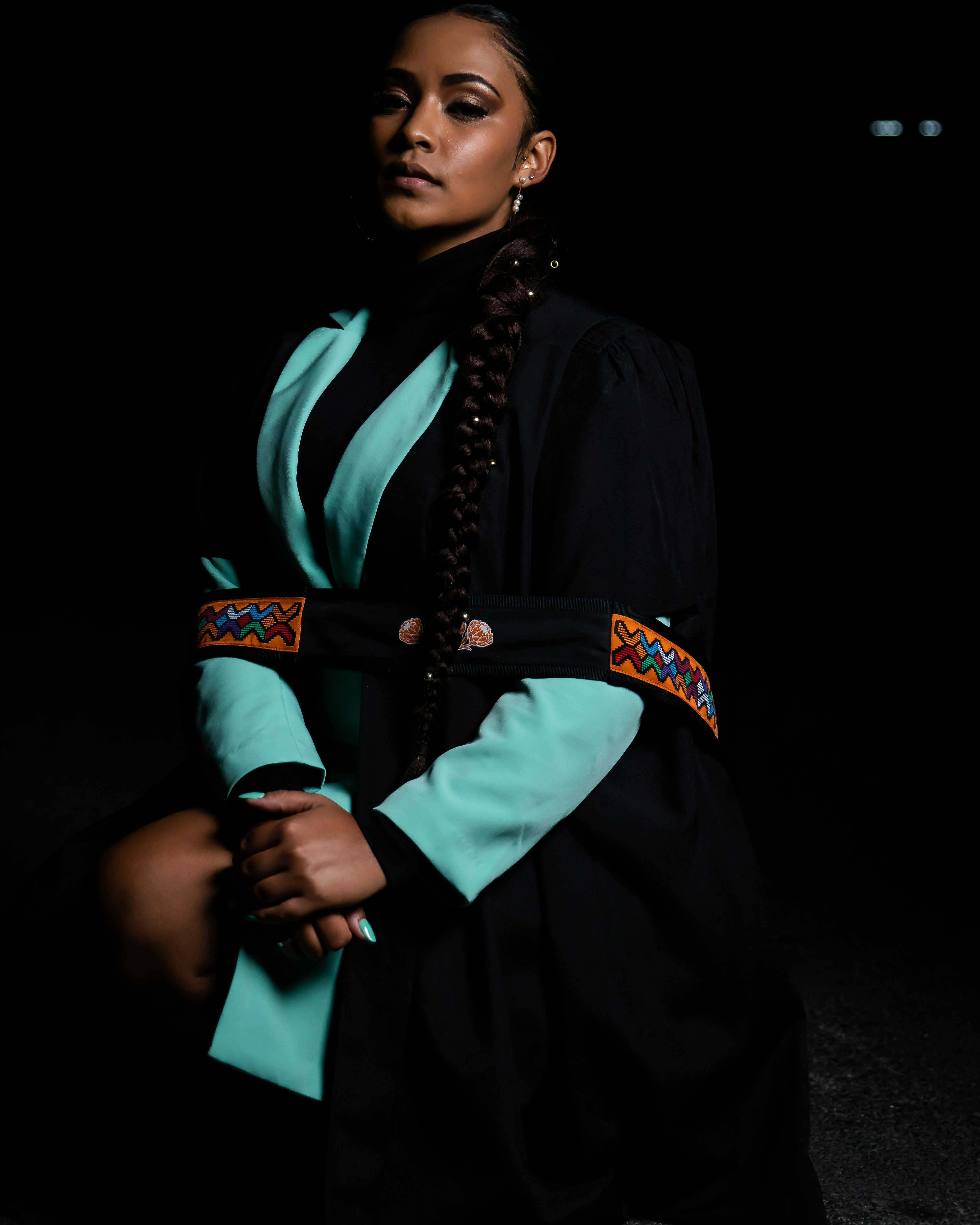 Grace under Spotlight: A poised portrait in ceremonial attire