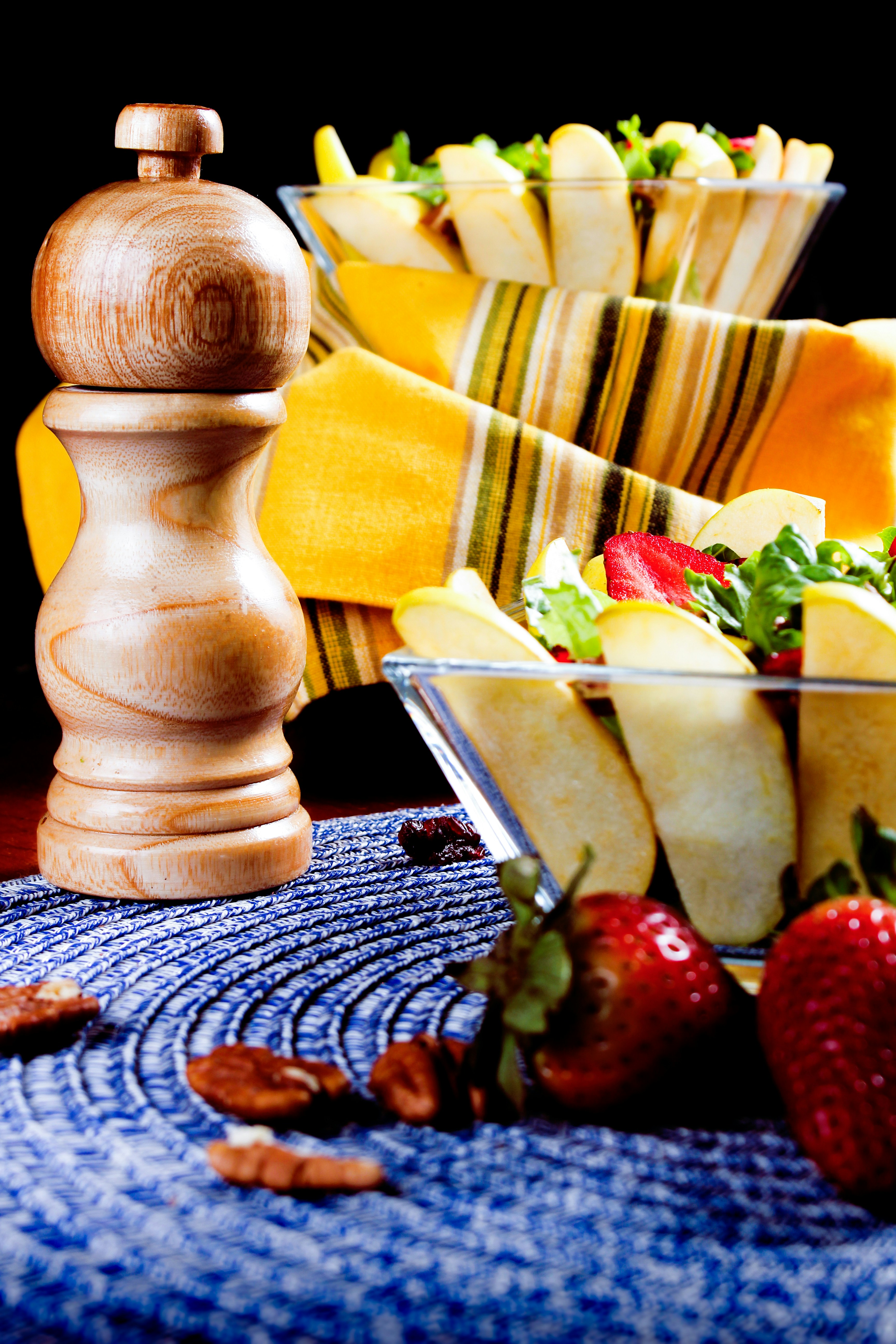 Rustic Pepper Mill Anchors a Bright Still-Life of Apples and Greens