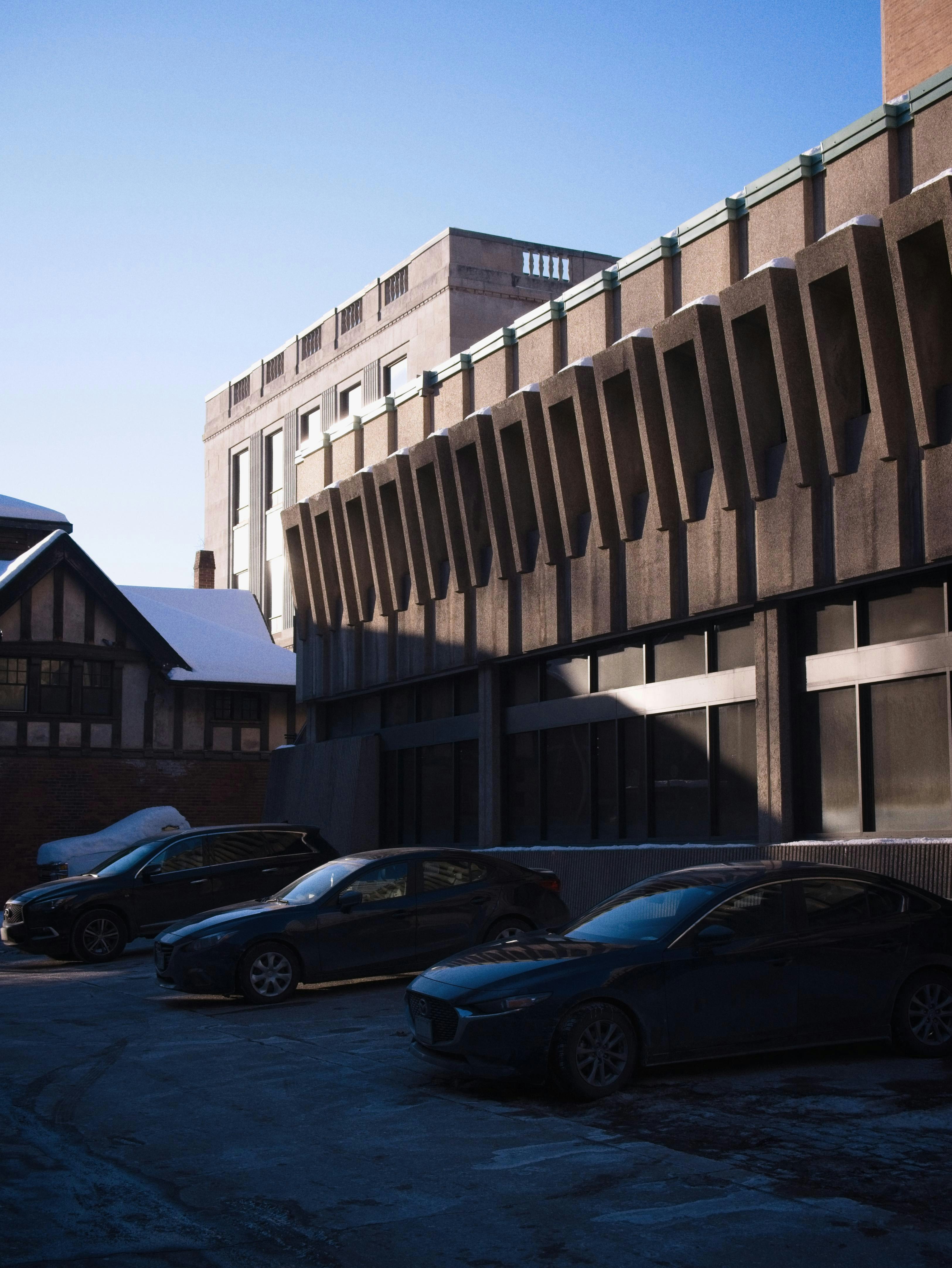 A group of cars parked in front of a building photo – Free Toronto ...