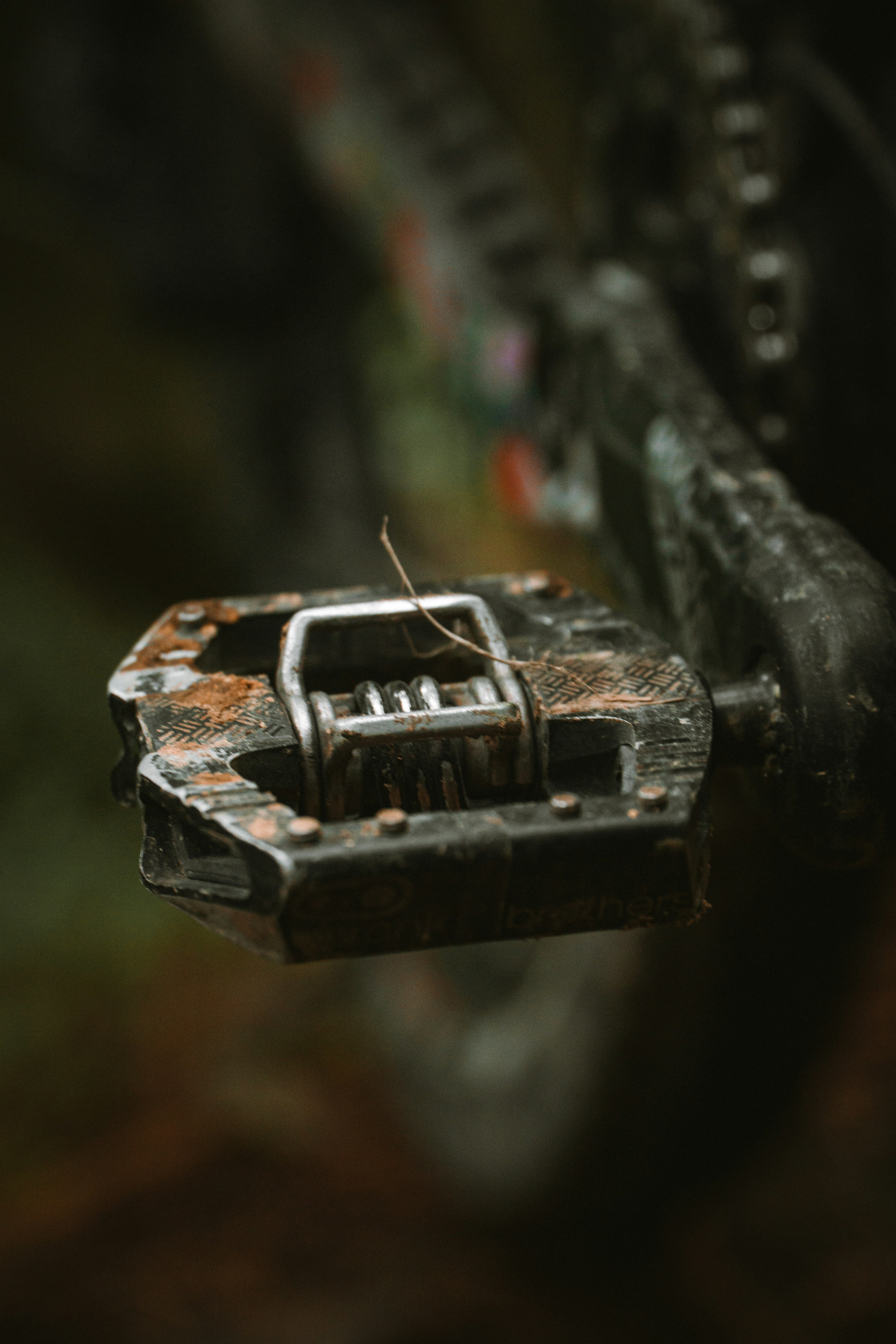 a close up of a rusted bike handle