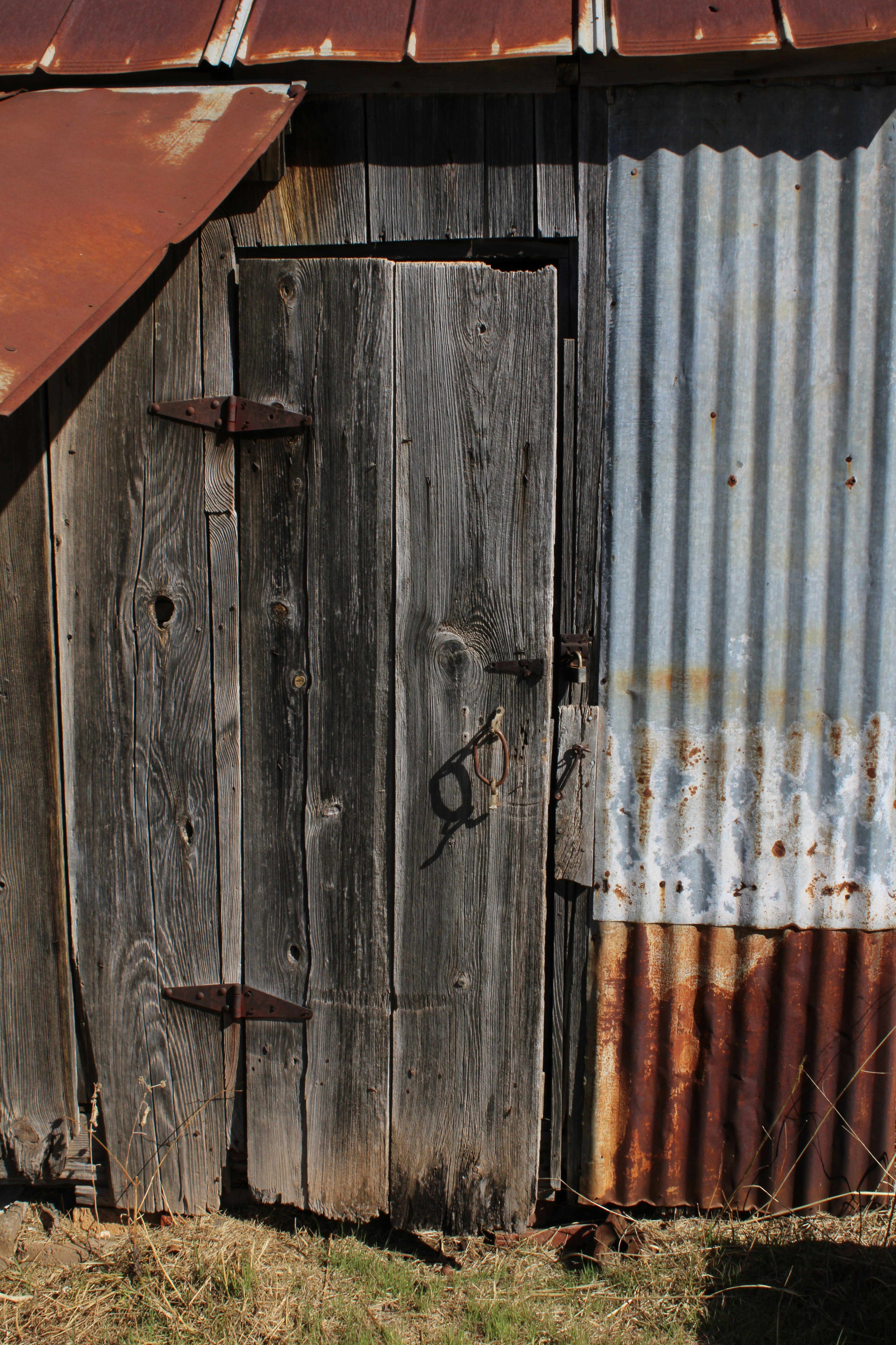 An old shed with a rusted metal roof photo – Free Building Image on ...