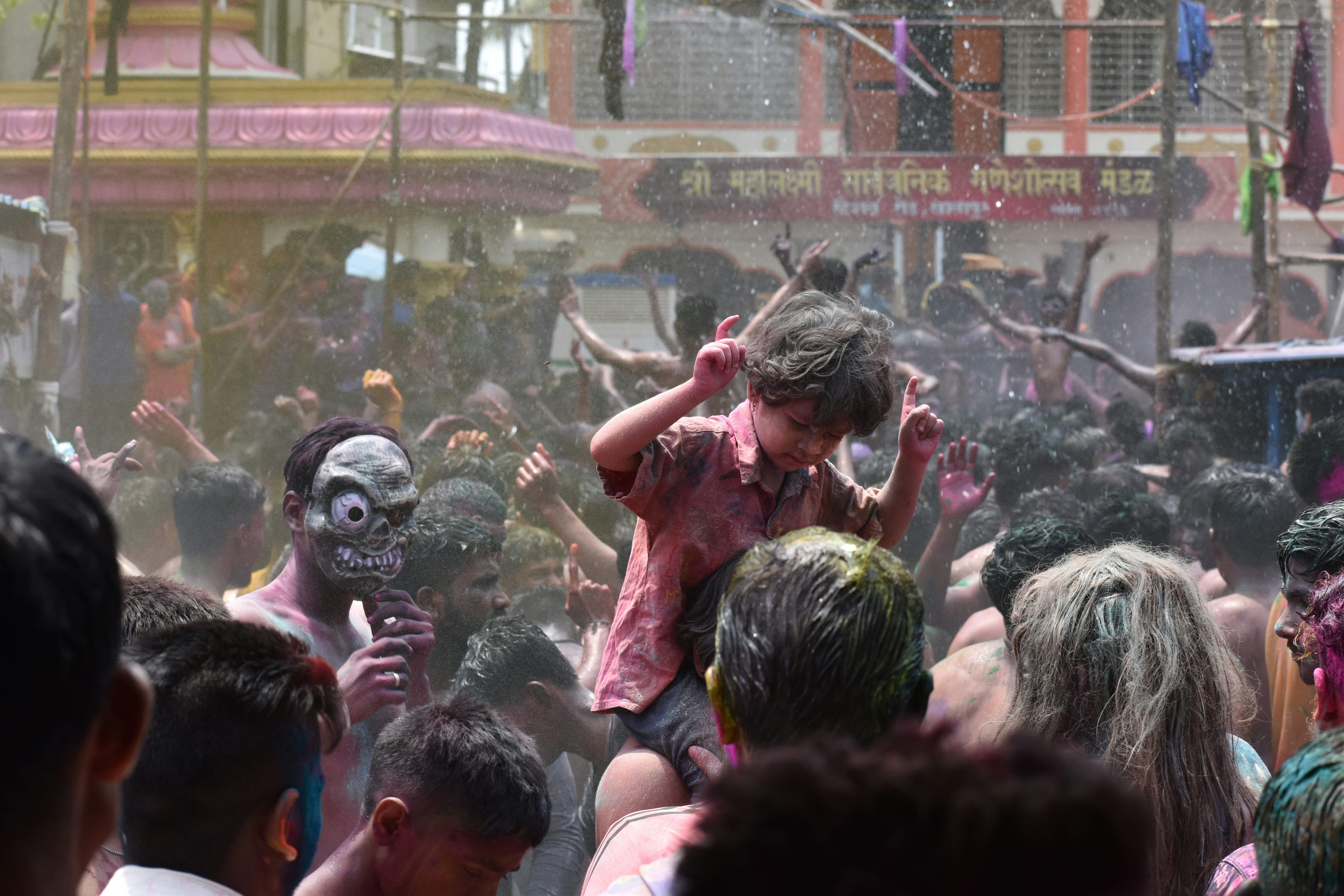 A crowd of people covered in colored powder photo – Free India Image on ...