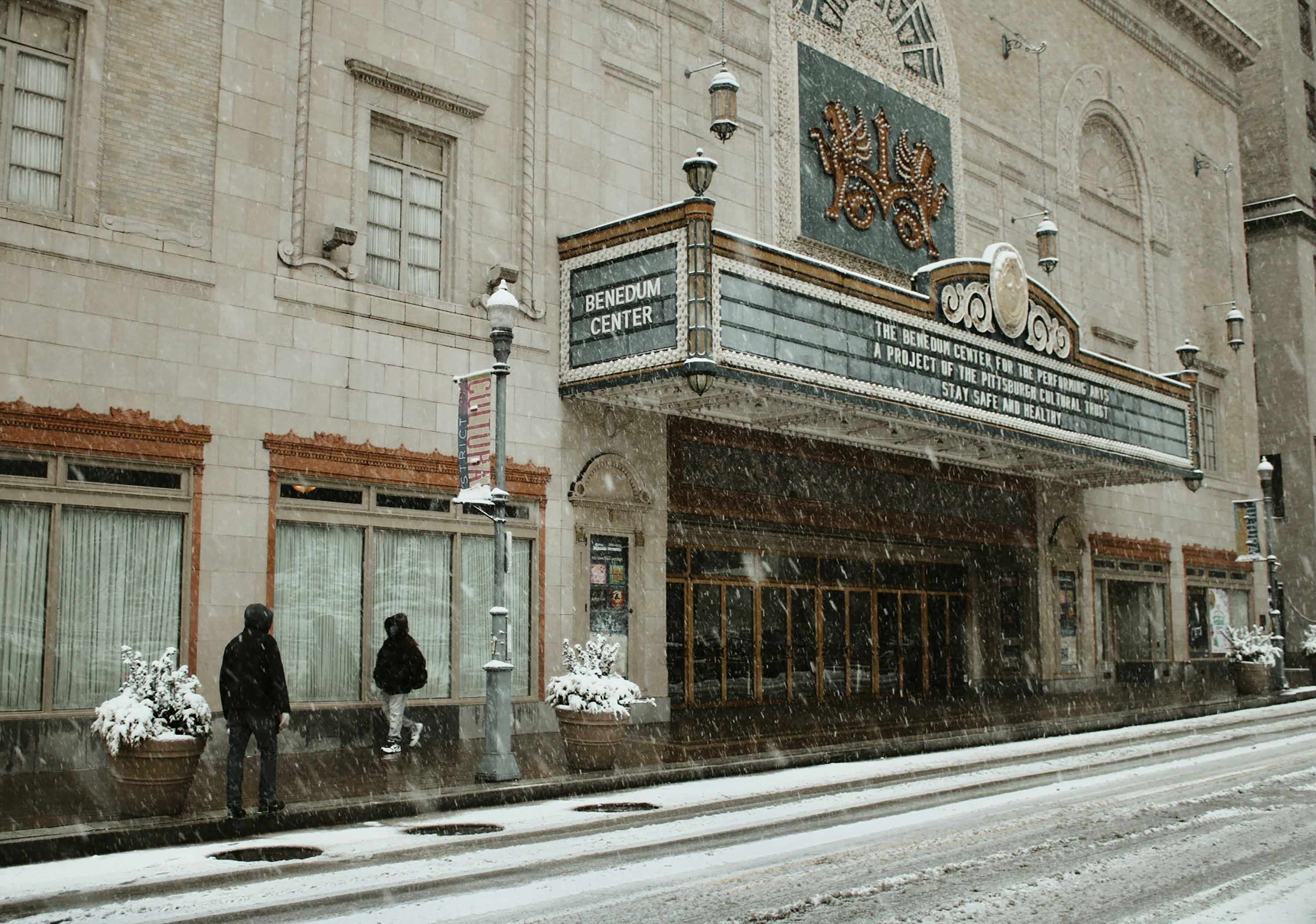 A movie theater on a snowy street corner photo – Free Pittsburgh Image ...