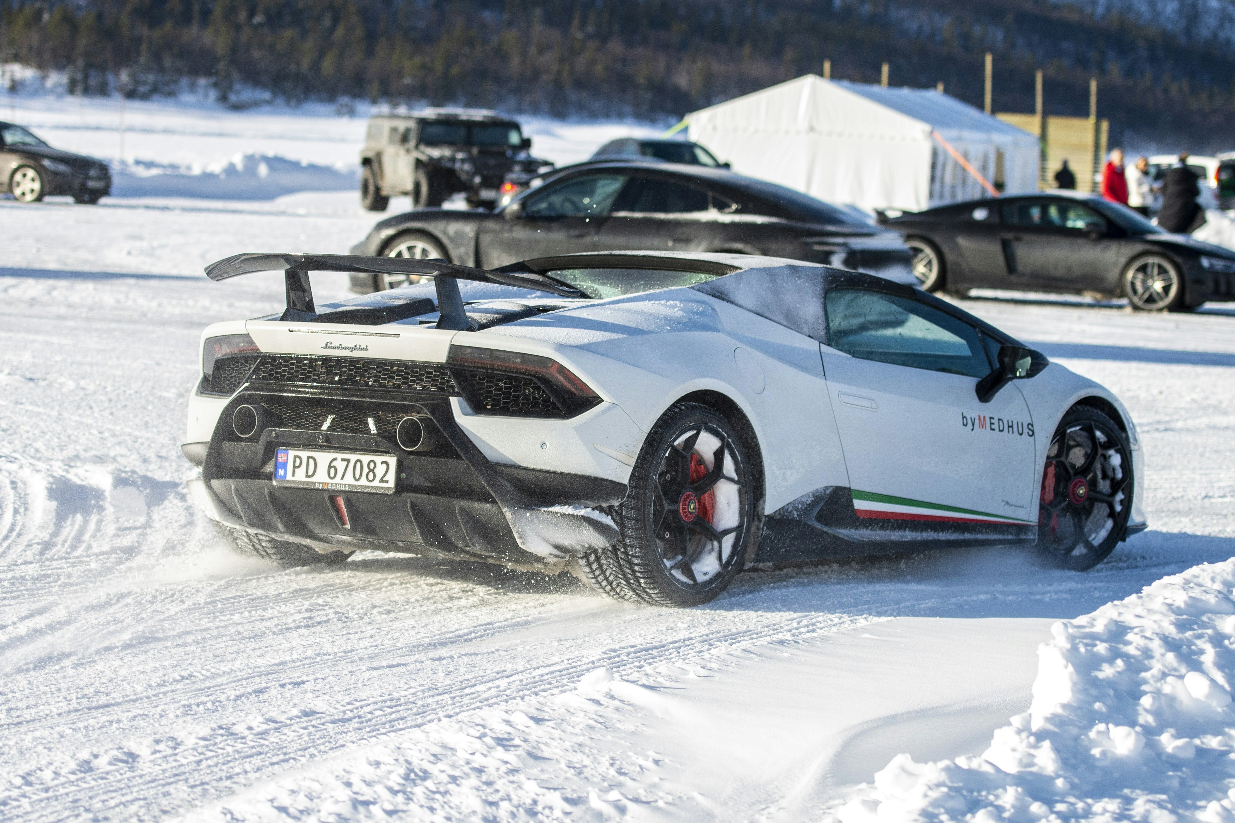 Snowbound Huracán: White Lamborghini Carves a Frosty Showground
