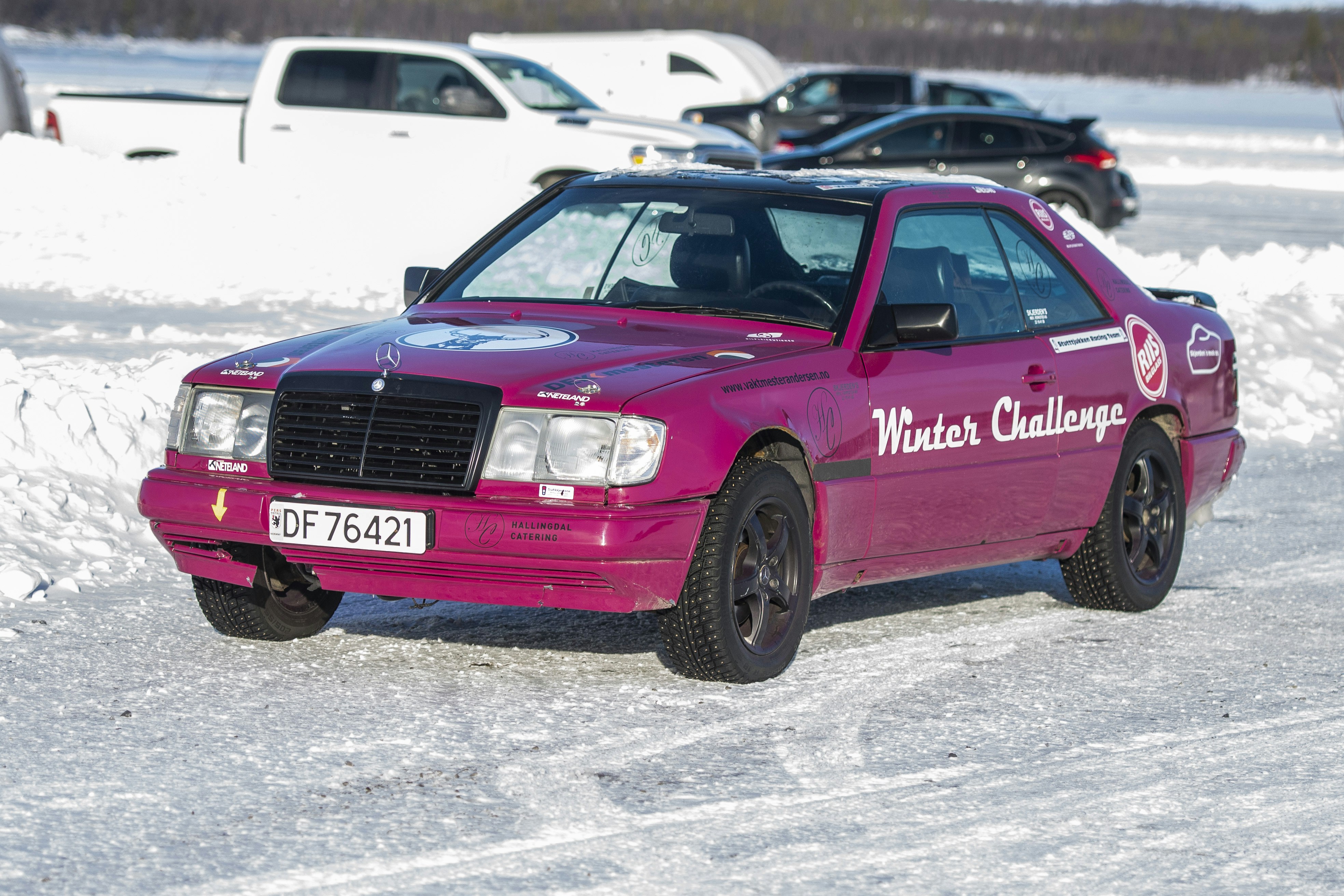 A pink car is parked in the snow photo – Free Automobile Image on Unsplash