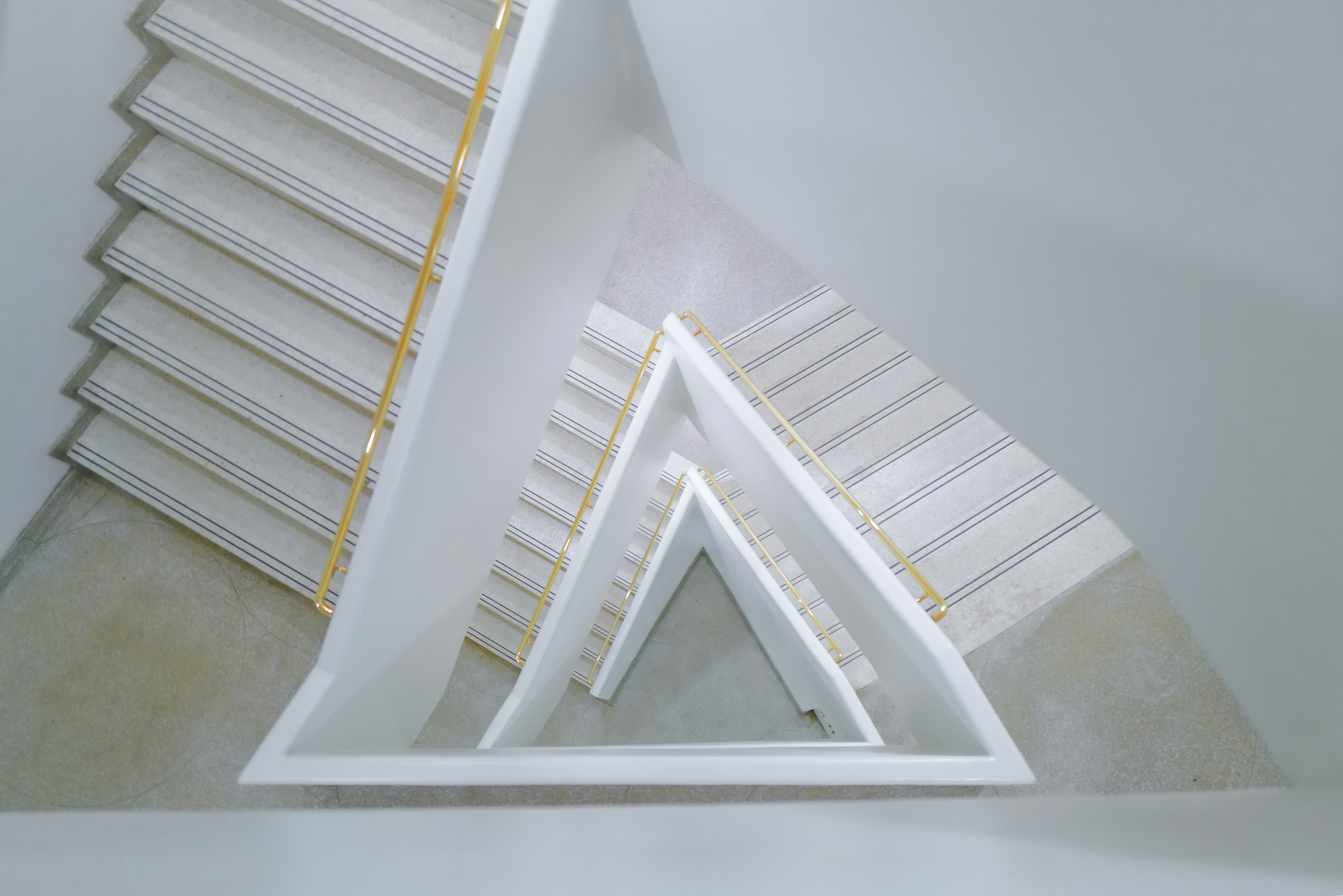 A view of a staircase from the top of a building photo – Free Grey ...