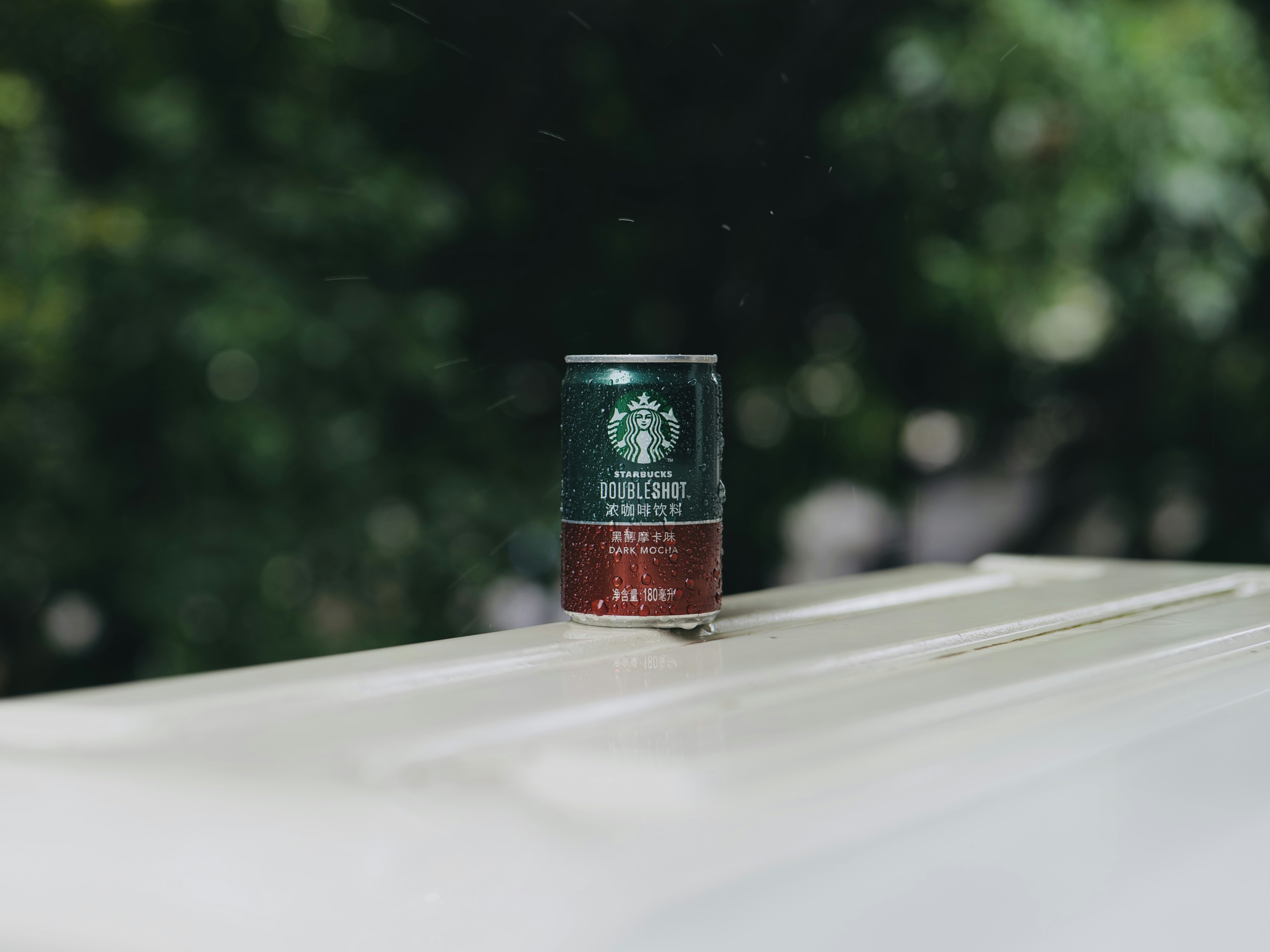 A can of starbucks coffee sitting on top of a roof photo – Free ...