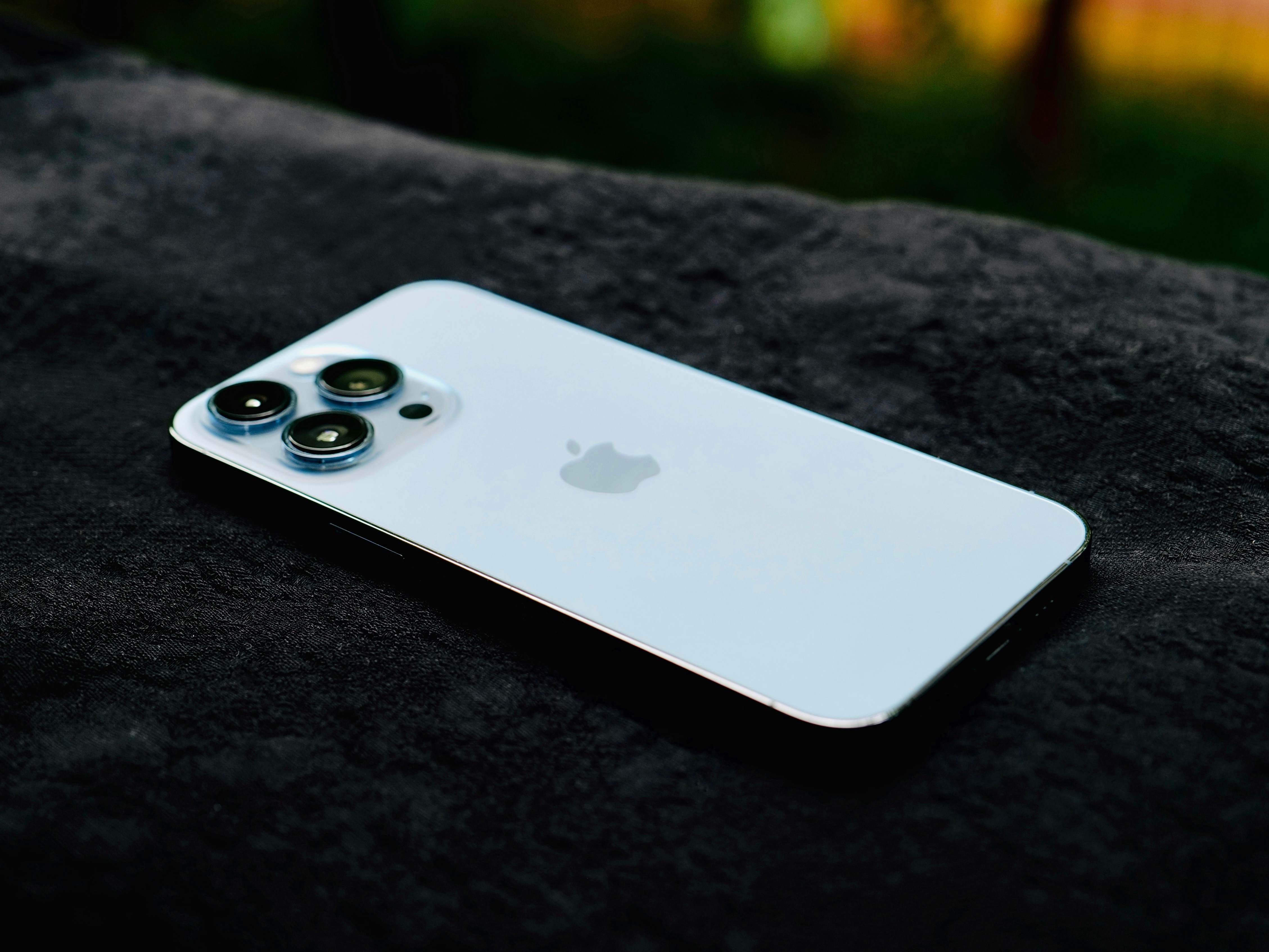 A close up of an iphone on a black surface photo – Free Mobile phone Image on Unsplash