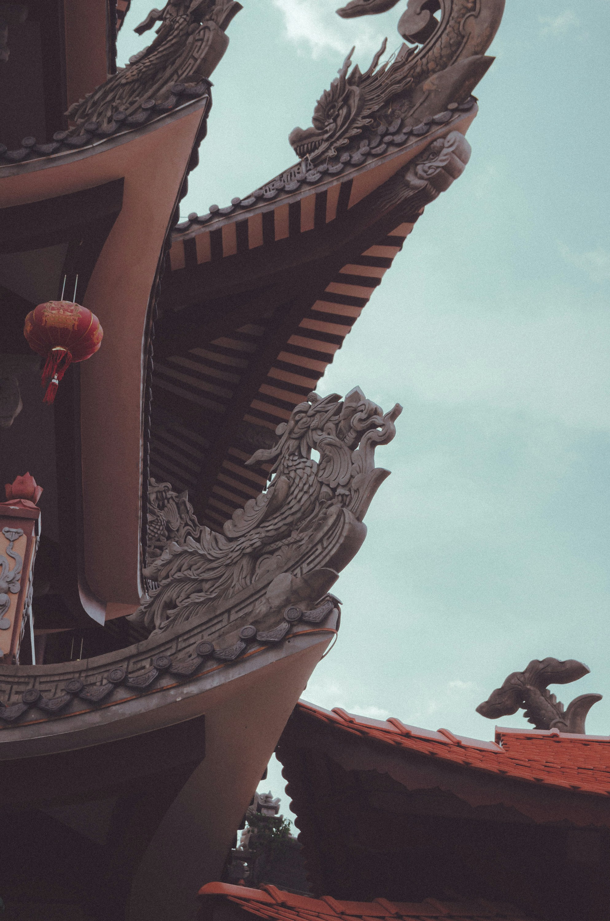 Dragon Crest Over Eaves: A Quiet Portrait of a Temple Roof