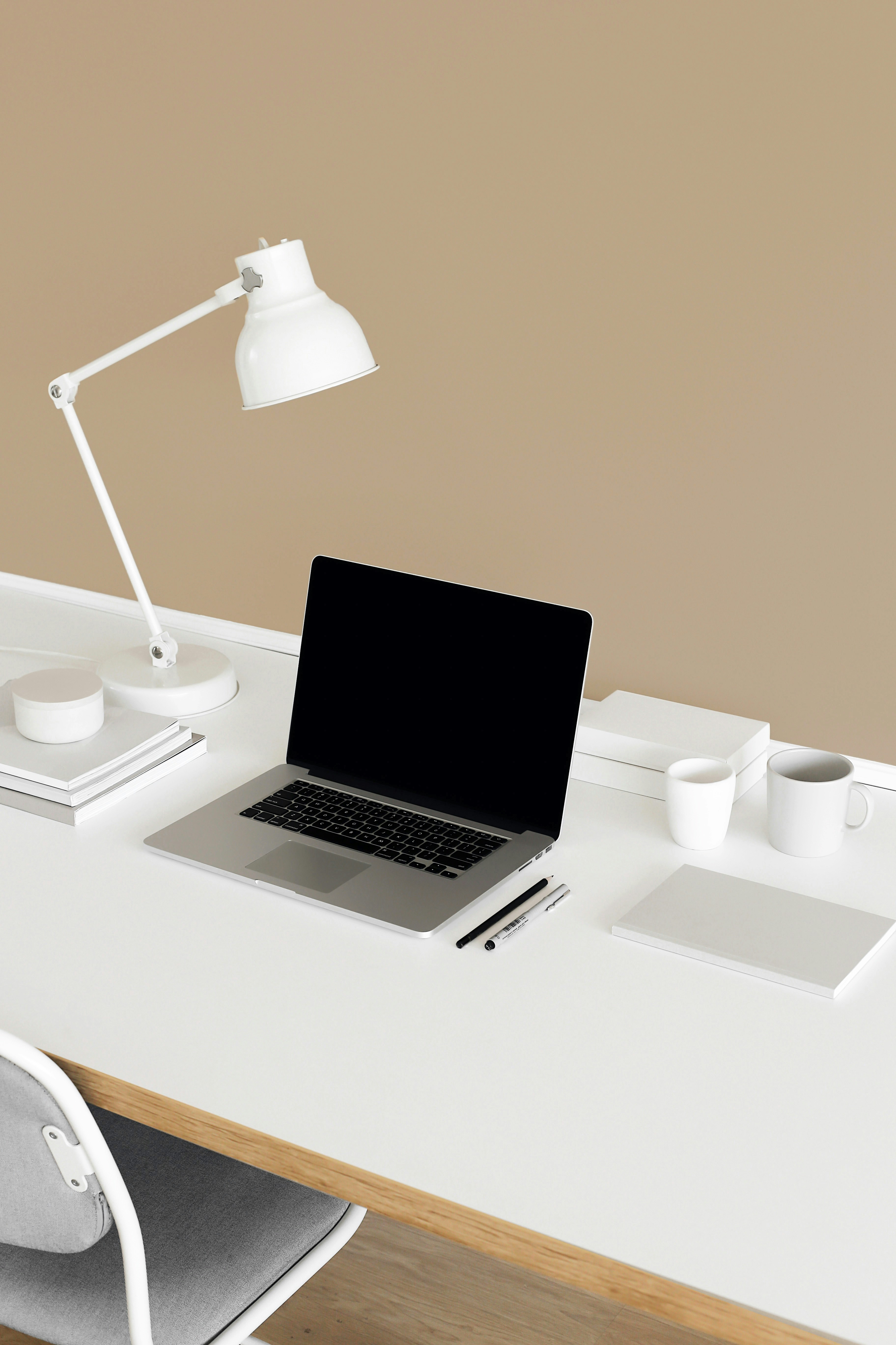 A laptop computer sitting on top of a white desk photo – Free Black ...