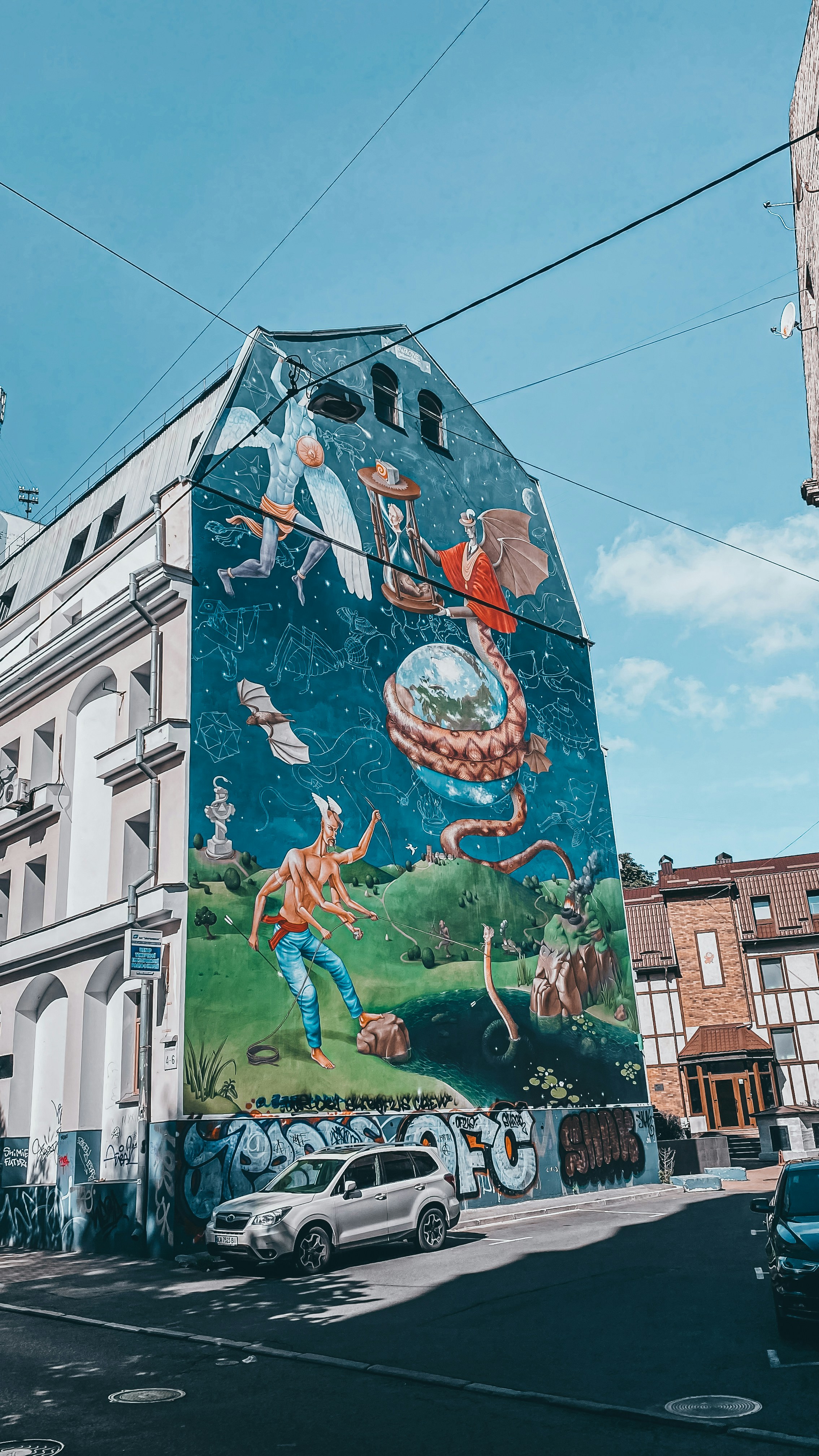 Mural Leviathan: A Tapestry of Fantasy over an Urban Street